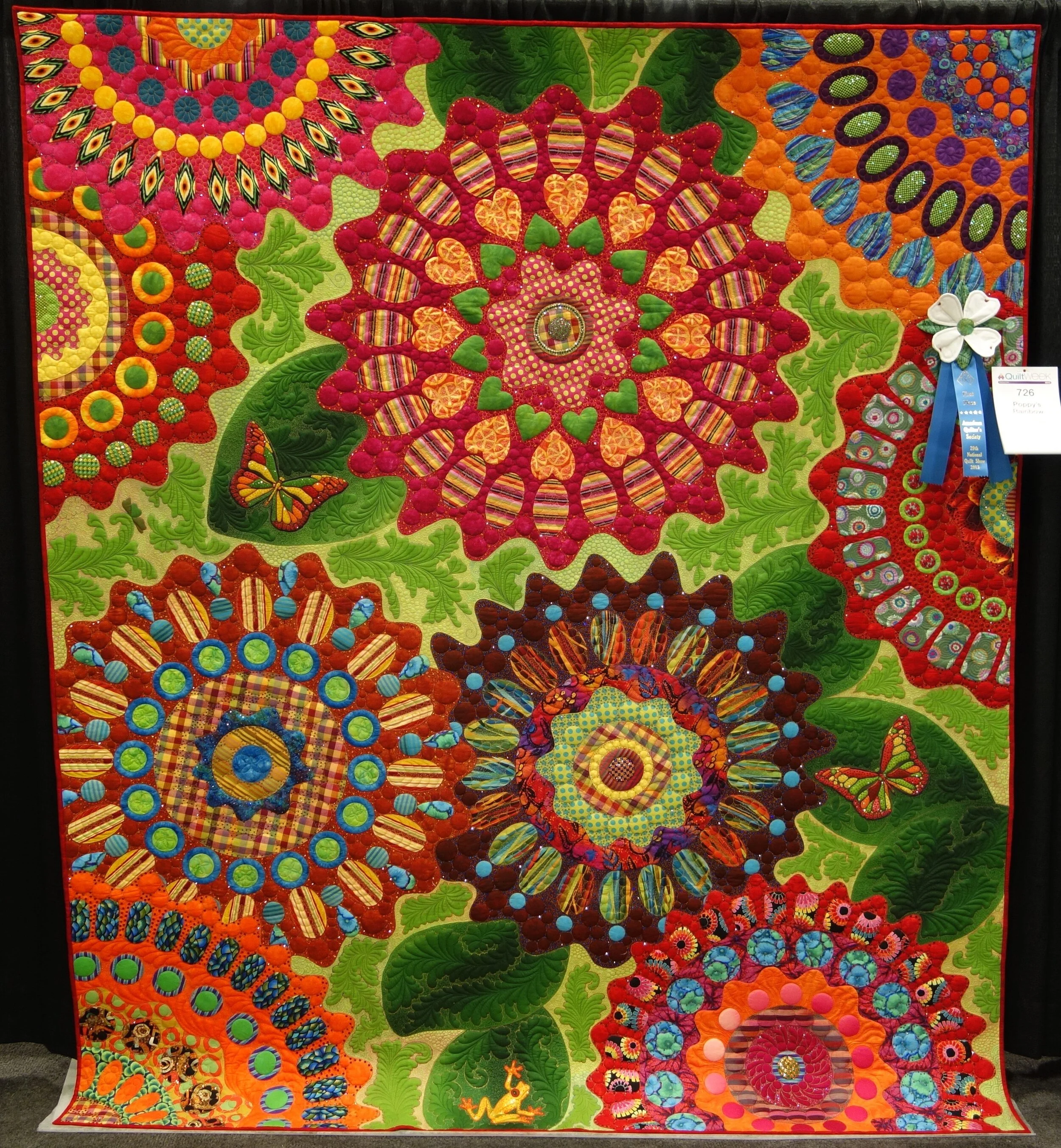 See "Poppy's Rainbow" a quilt by Mark L. Sherman — The Quilt Show