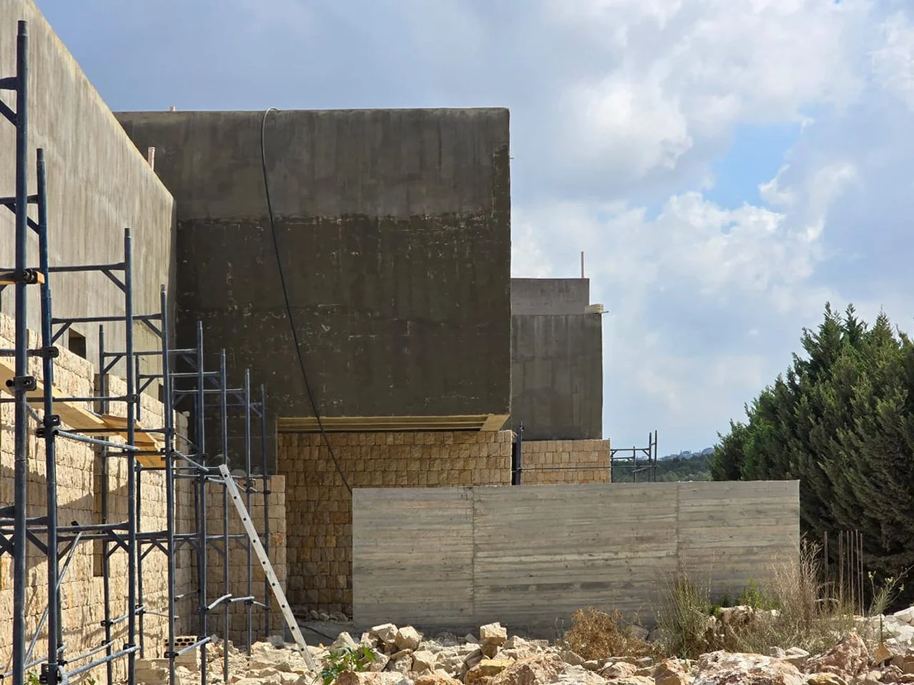 Villa AM Stone Cladding in Progress — DAJH Architects