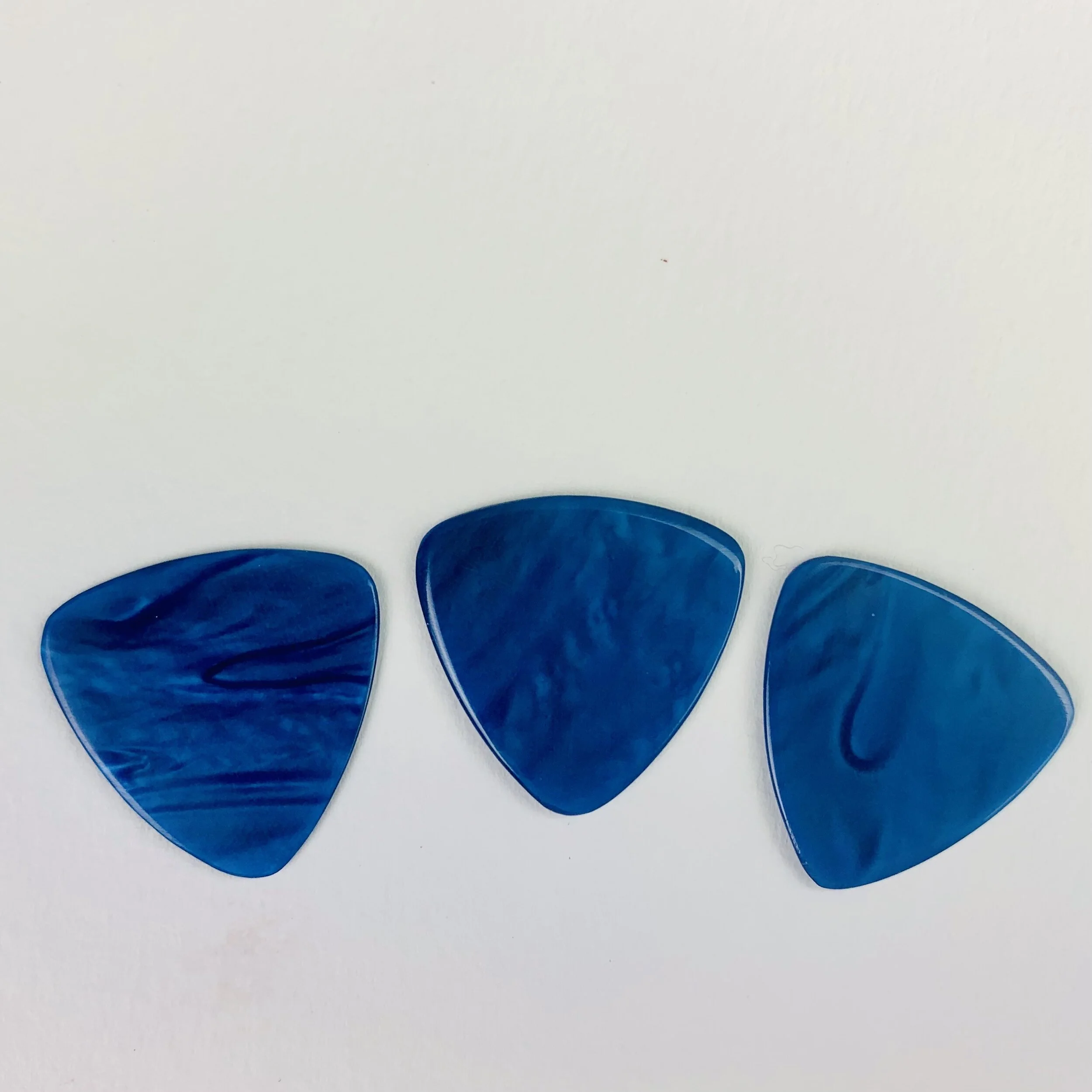 Store 2 — Apollo Picks | Custom Made. Casein and PEEK.