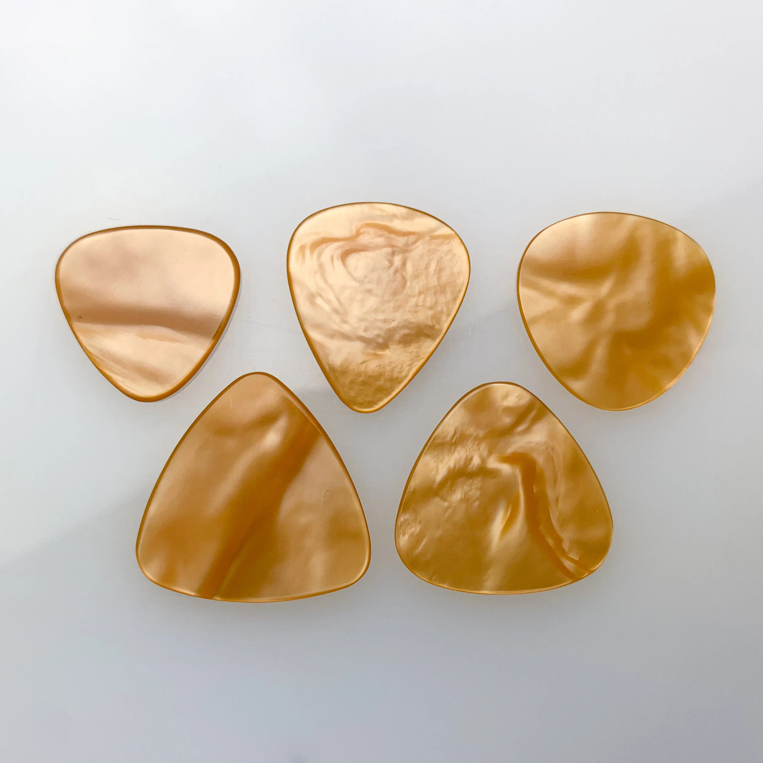 Store 2 — Apollo Picks | Custom Made. Casein and PEEK.