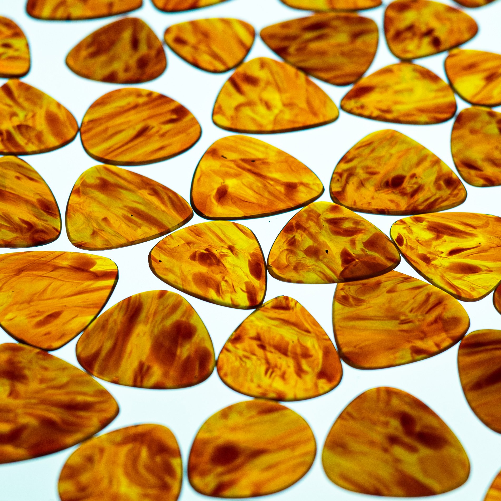 Store 2 — Apollo Picks | Custom Made. Casein and PEEK.