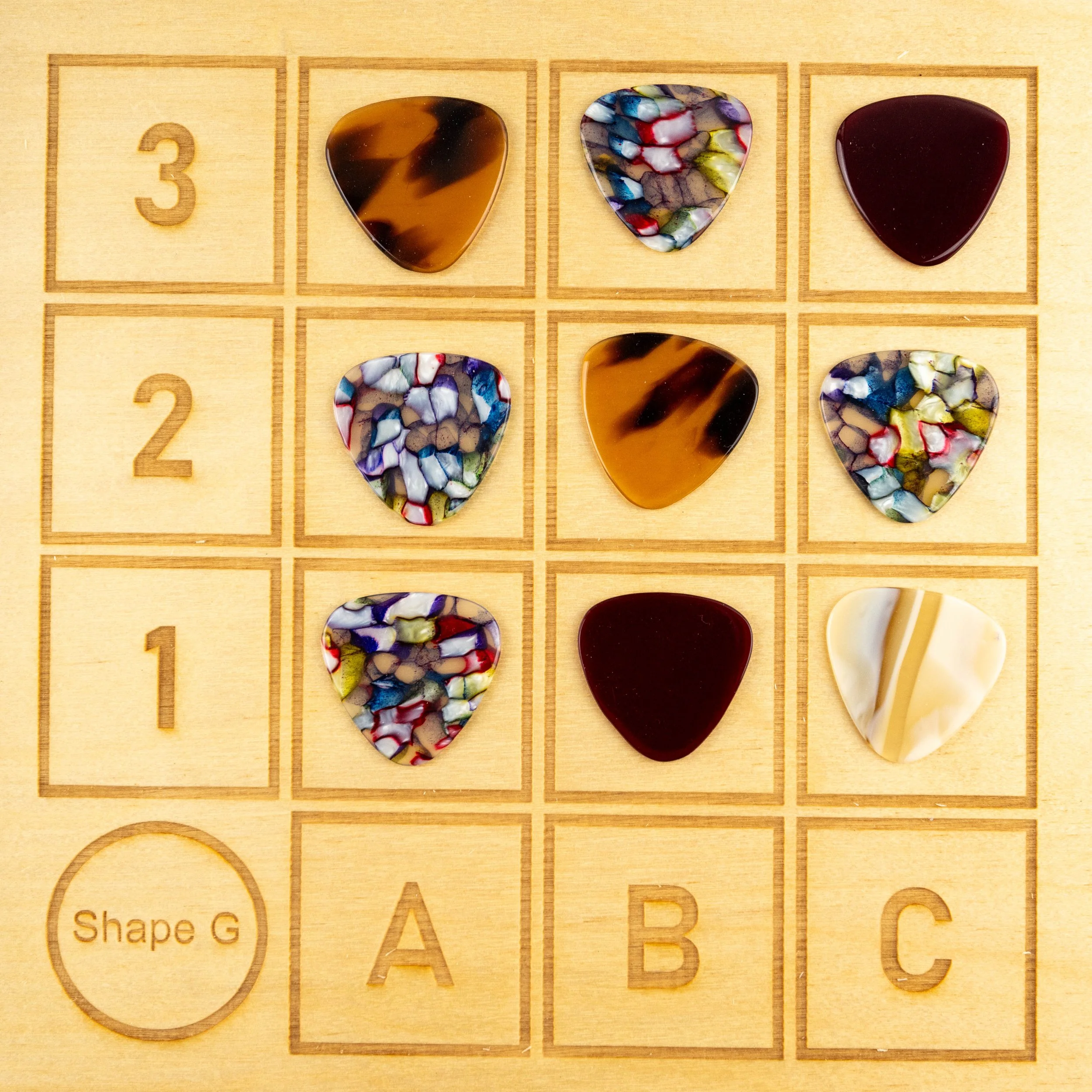 Shape G — Apollo Picks | Custom Made. Casein and PEEK.