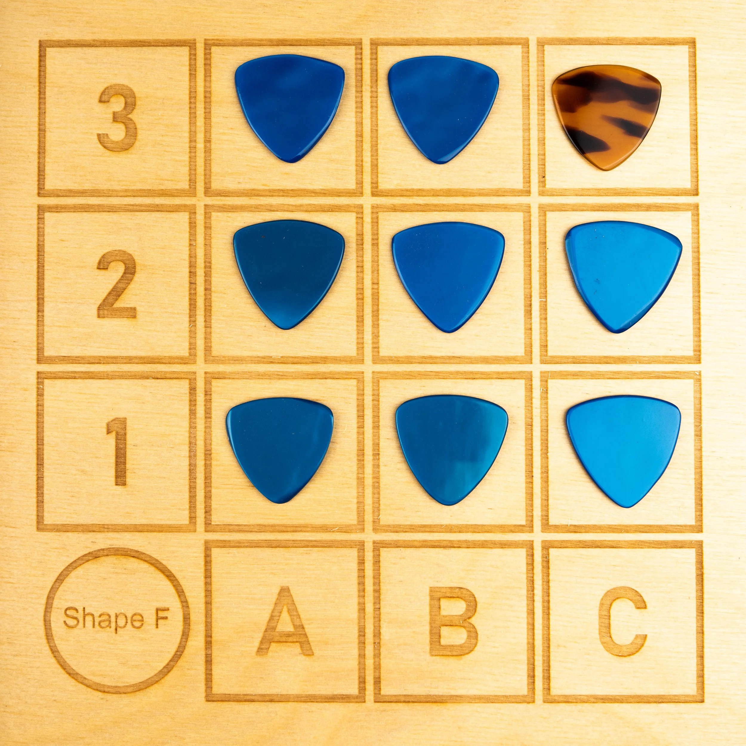 Shape F — Apollo Picks | Custom Made. Casein and PEEK.