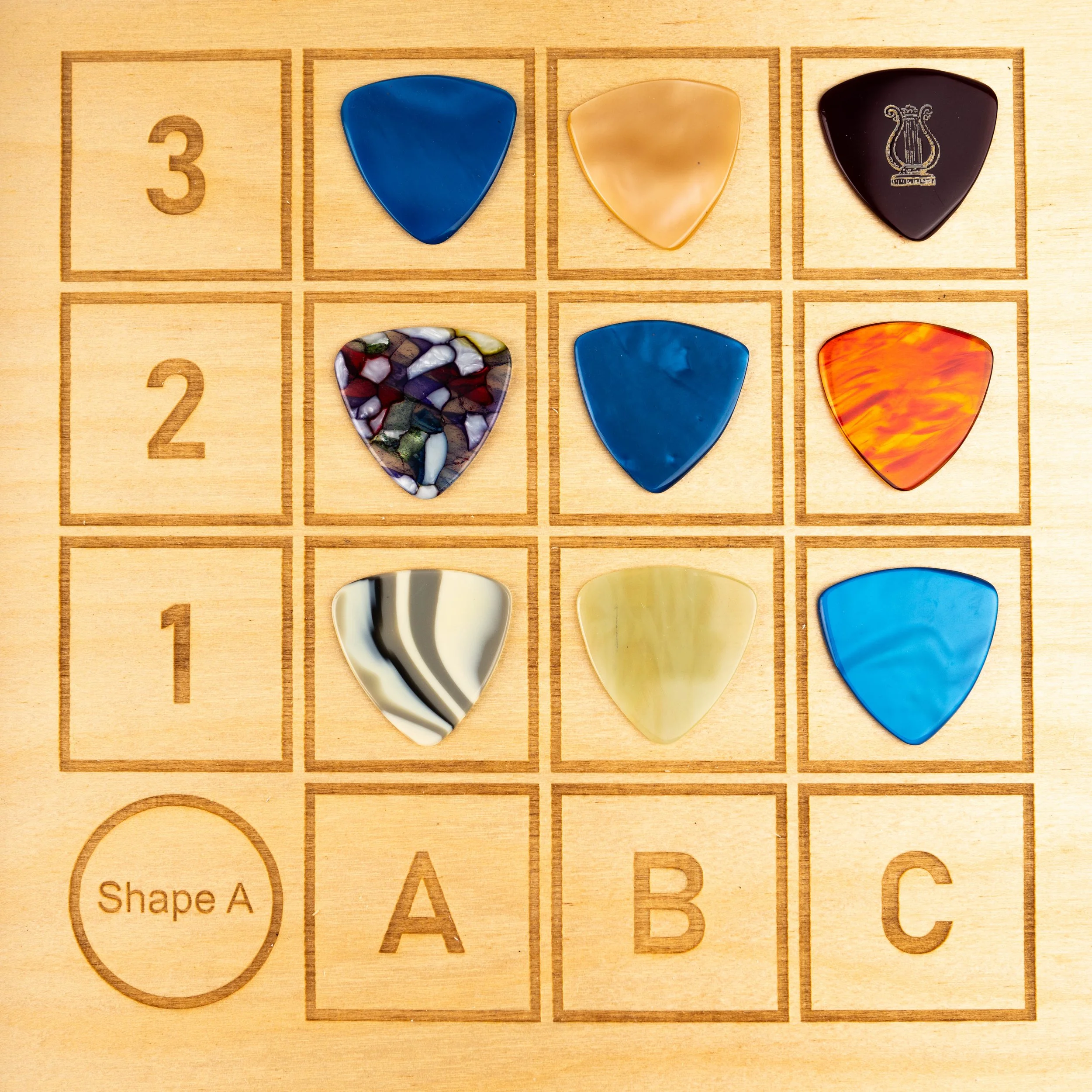 Shape A — Apollo Picks | Custom Made. Casein and PEEK.