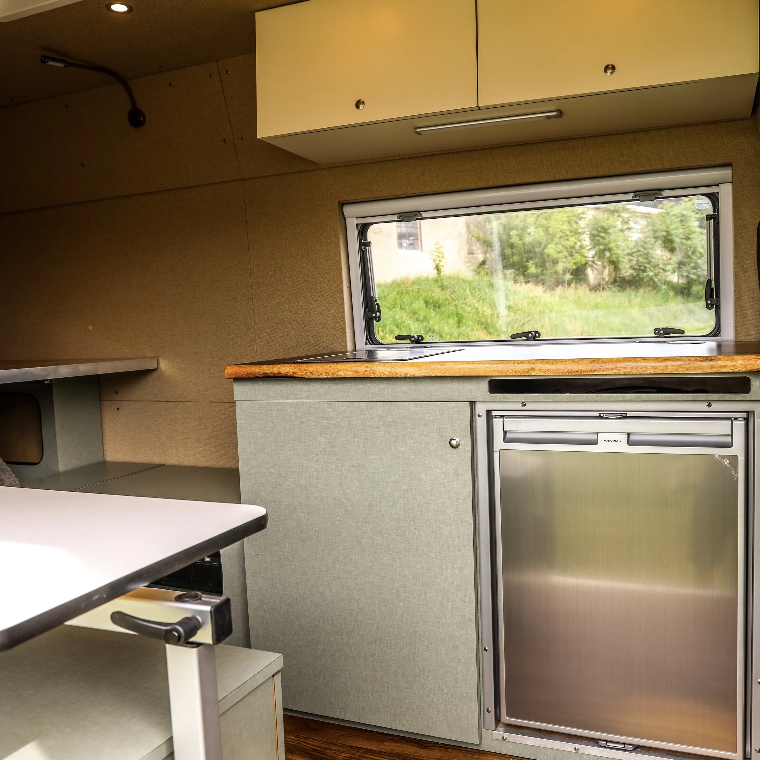 Custom Camper Vans for Hauling Dogs: Secure Kennels, Climate Control ...