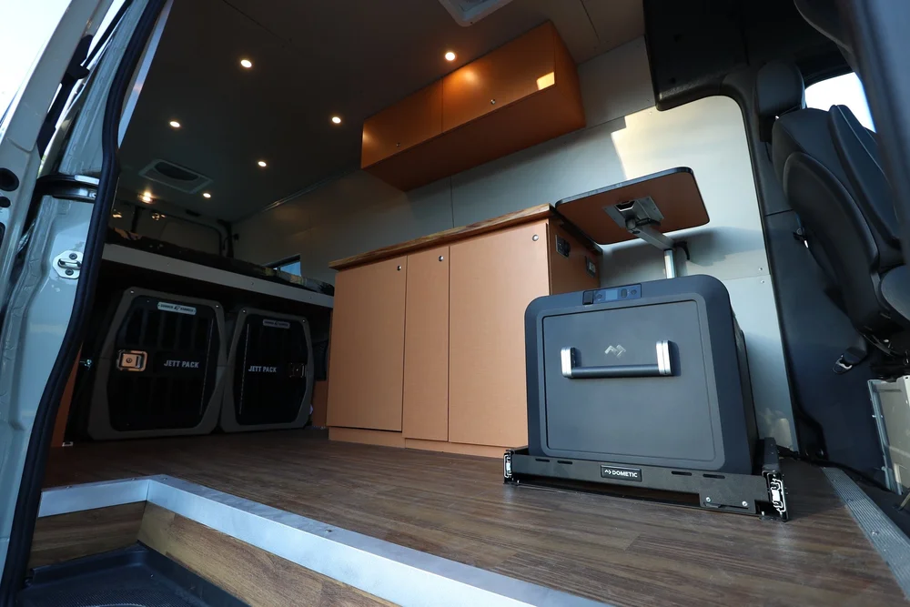 Custom Camper Vans for Hauling Dogs: Secure Kennels, Climate Control ...