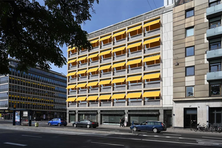 Alux's Pivot arm awnings Lights Up the Shell House