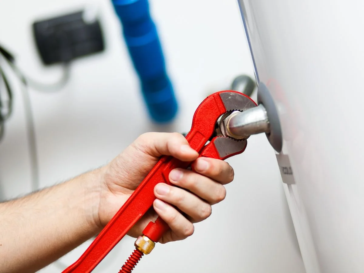 Hot Water Heater Leaking: Common Causes and How to Fix It — Spotless ...