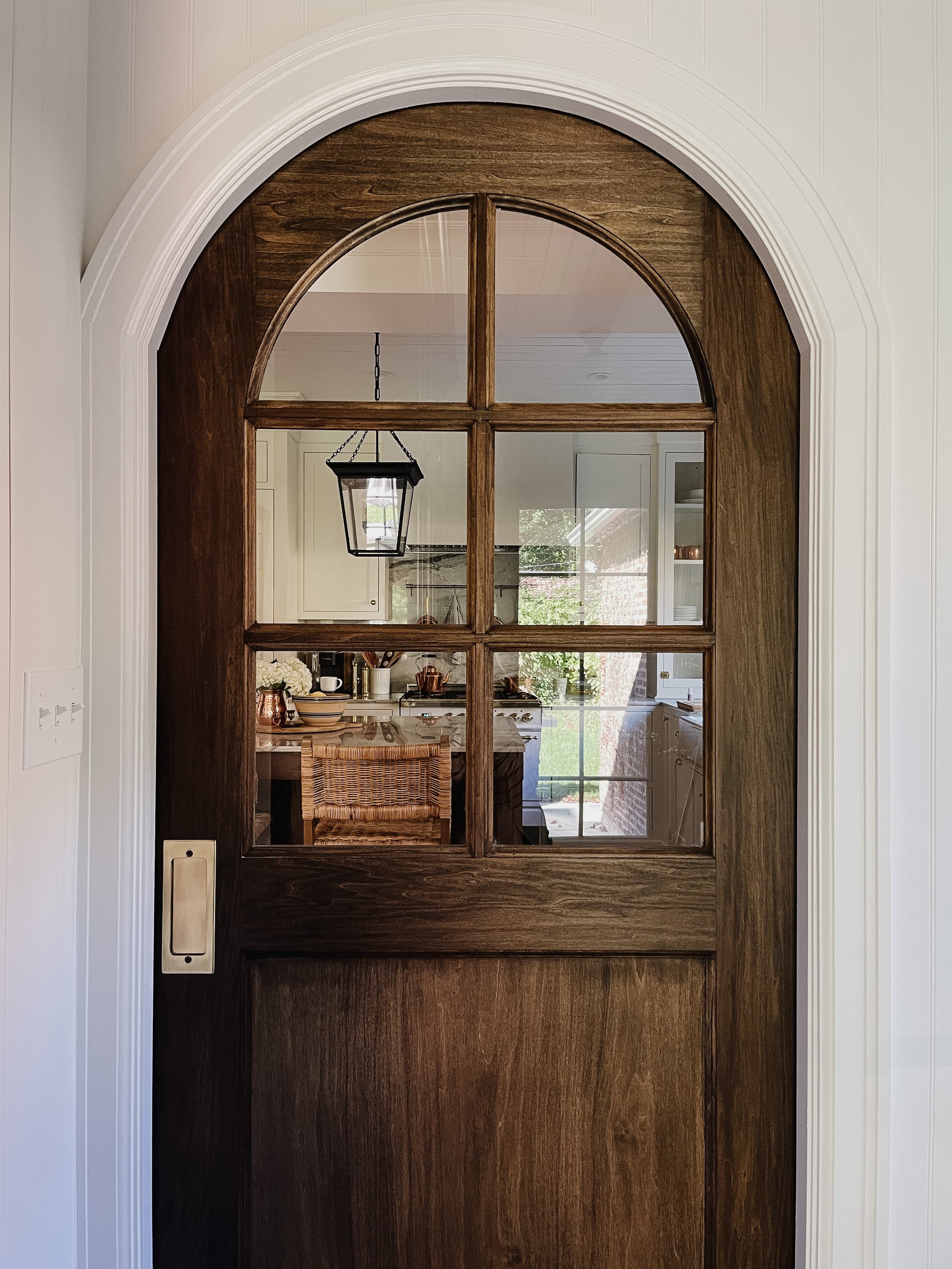 All The Details on Our (Faux) Arched Pocket Door | We're the Whites