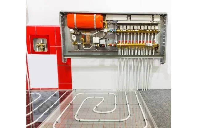 Role of Power Flushing in Heating Systems — TMG Plumbing & Heating Services