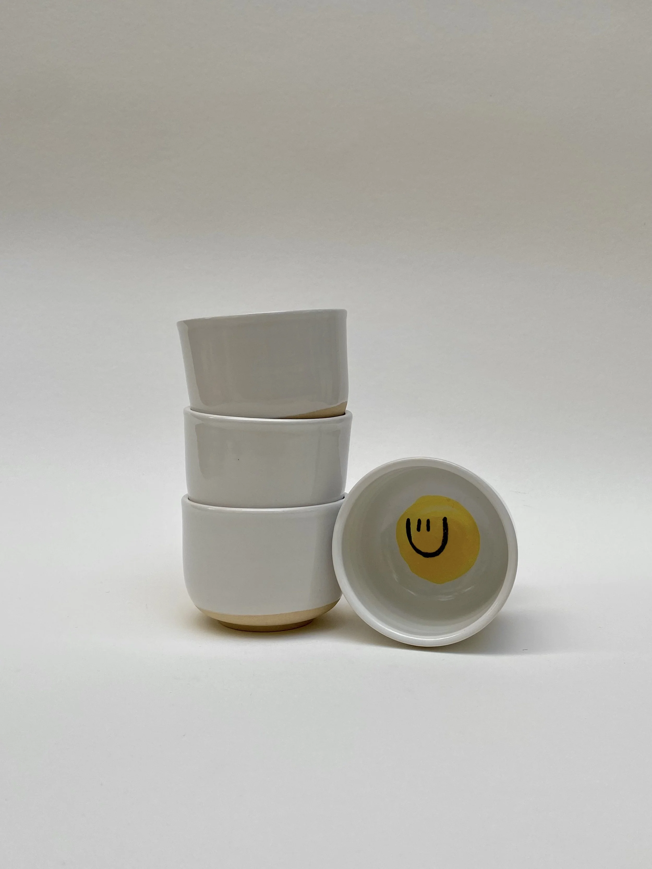 Handmade ceramic smiley cups — Helka ceramics