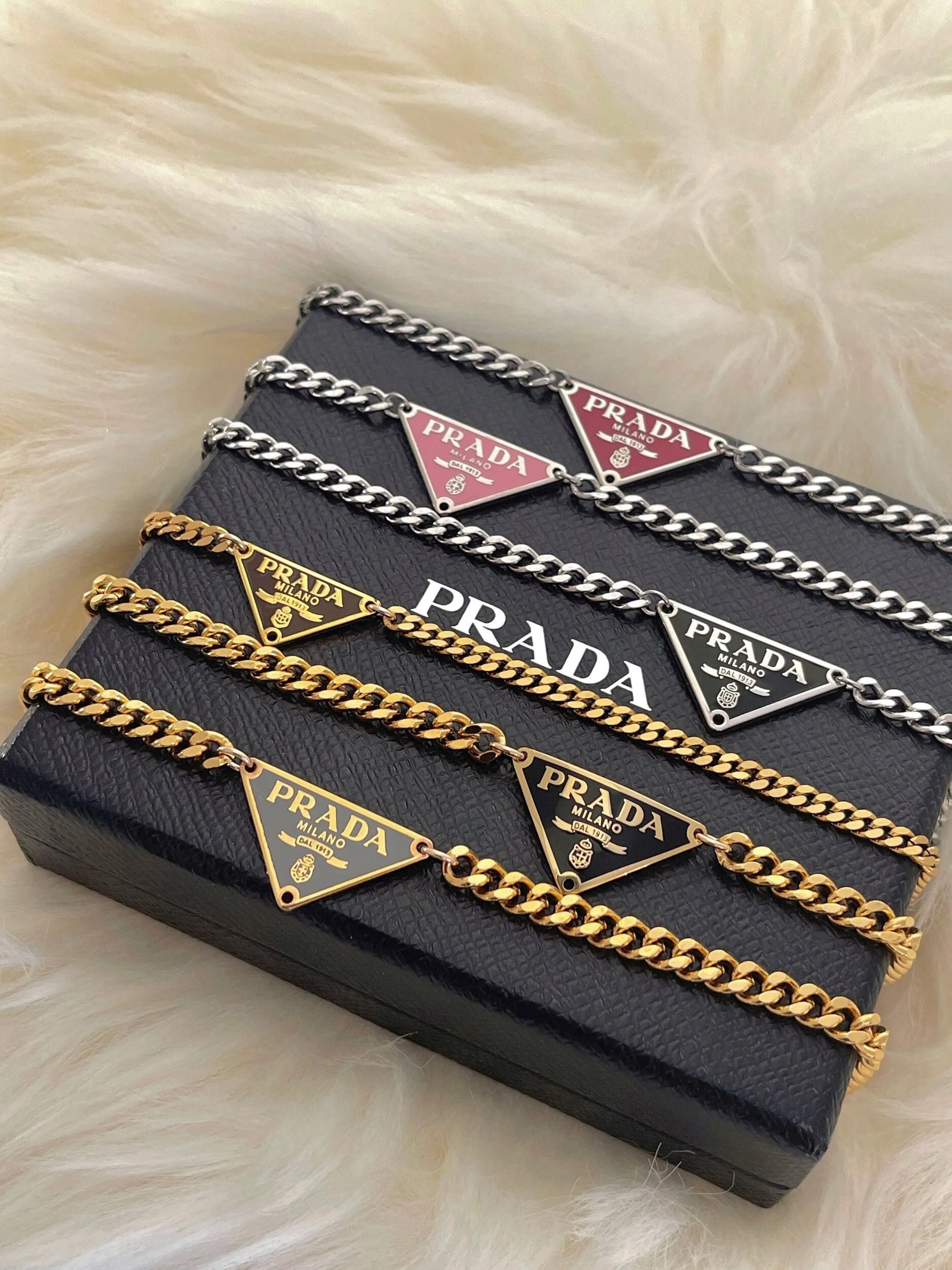 Prada Triangle Logo Collection — Shop — LUXE Reworked