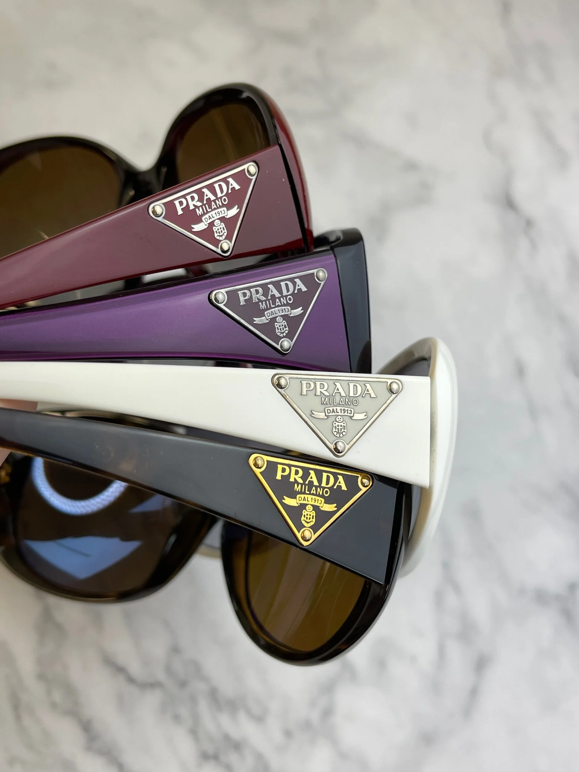 Prada Triangle Logo Collection — Shop — LUXE Reworked