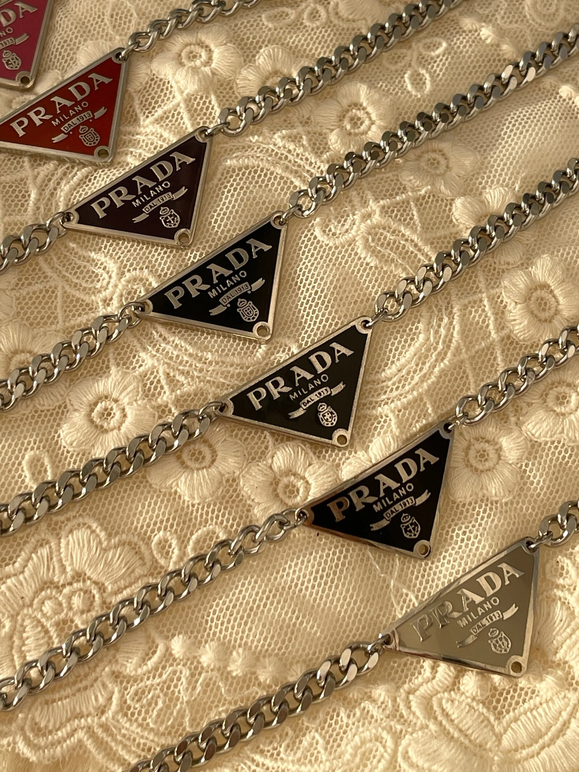 Prada Triangle Logo Collection — Shop — LUXE Reworked