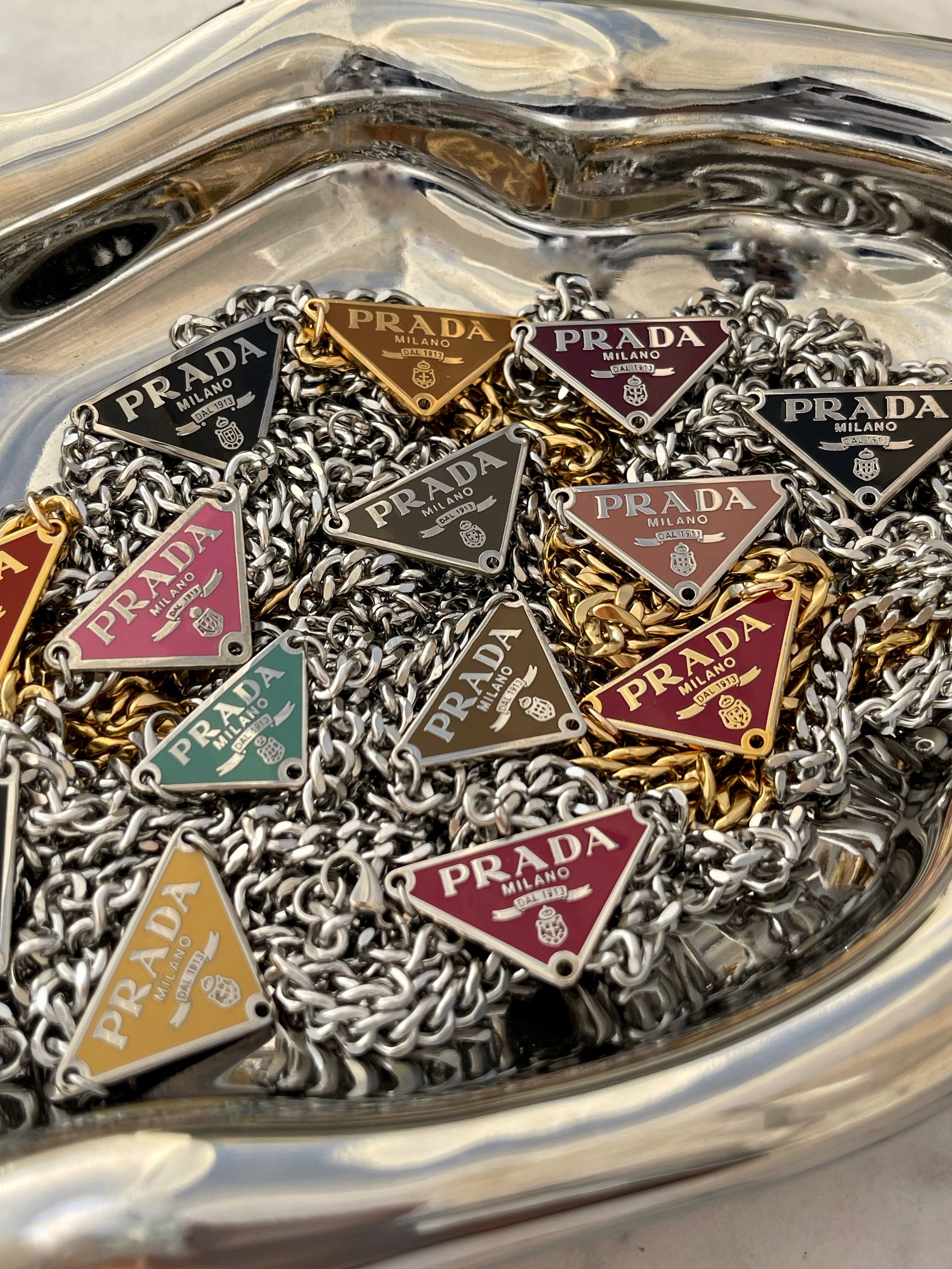 Prada Triangle Logo Collection — Shop — LUXE Reworked