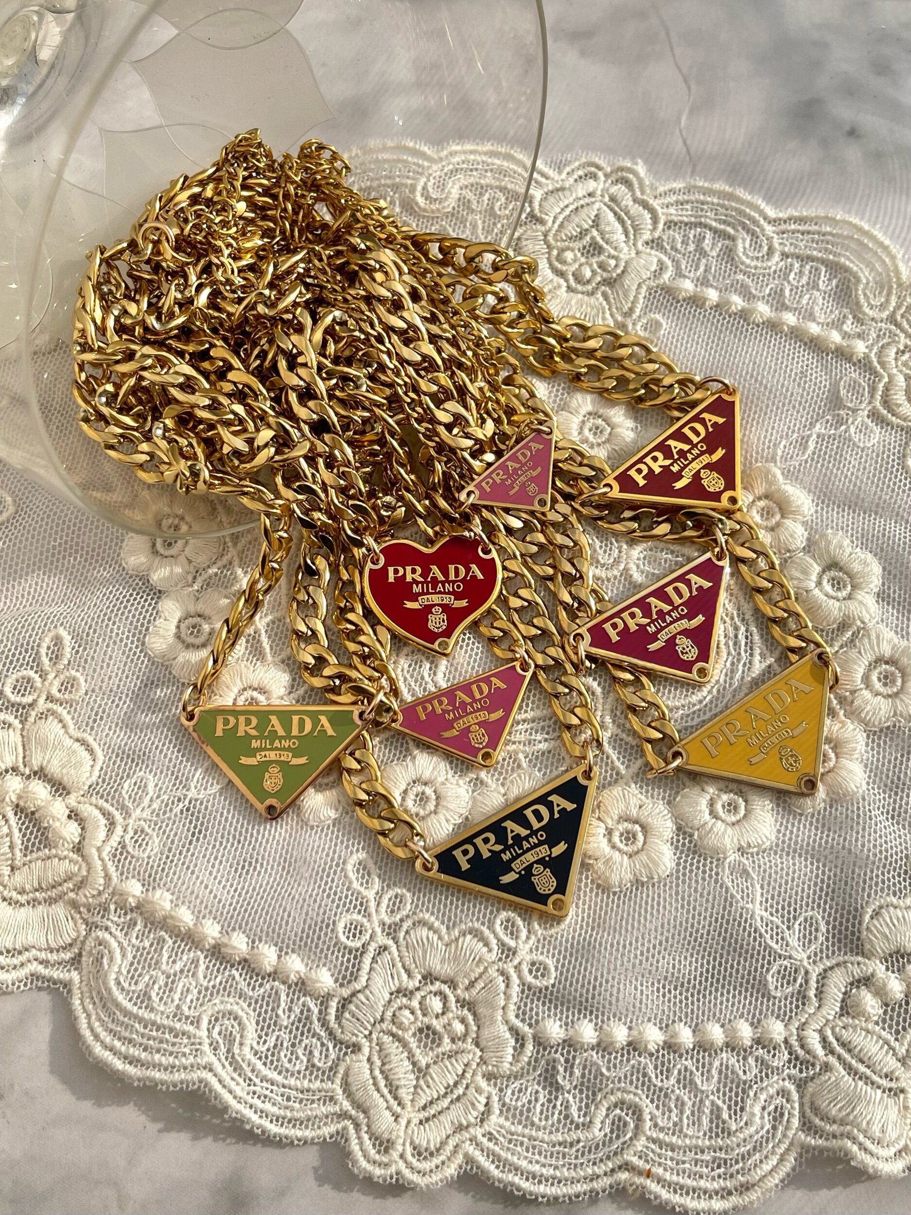 Prada Triangle Logo Collection — Shop — LUXE Reworked