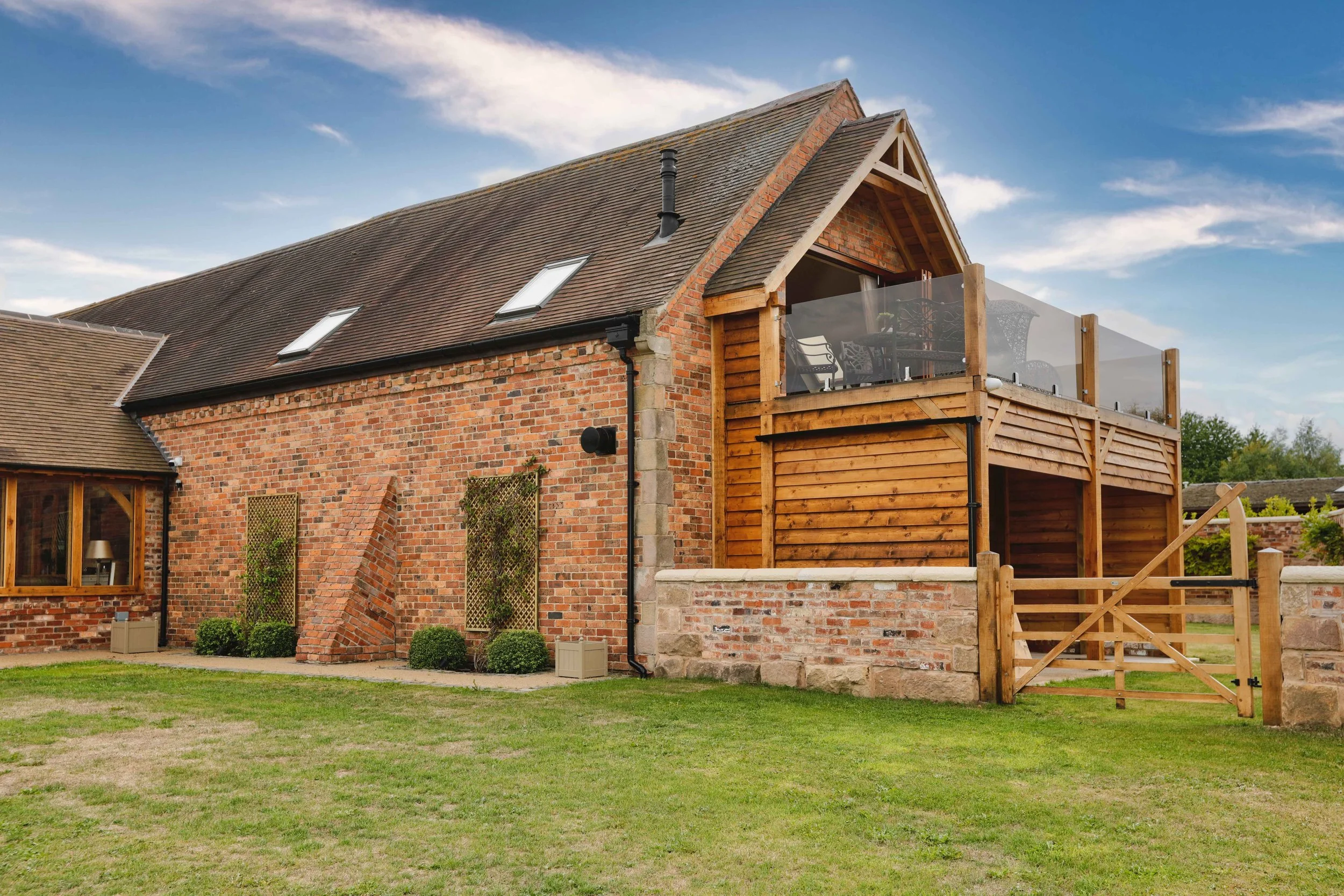 An extension and new balcony at a converted barn in Melbourne, Derbyshire — The Practical ...