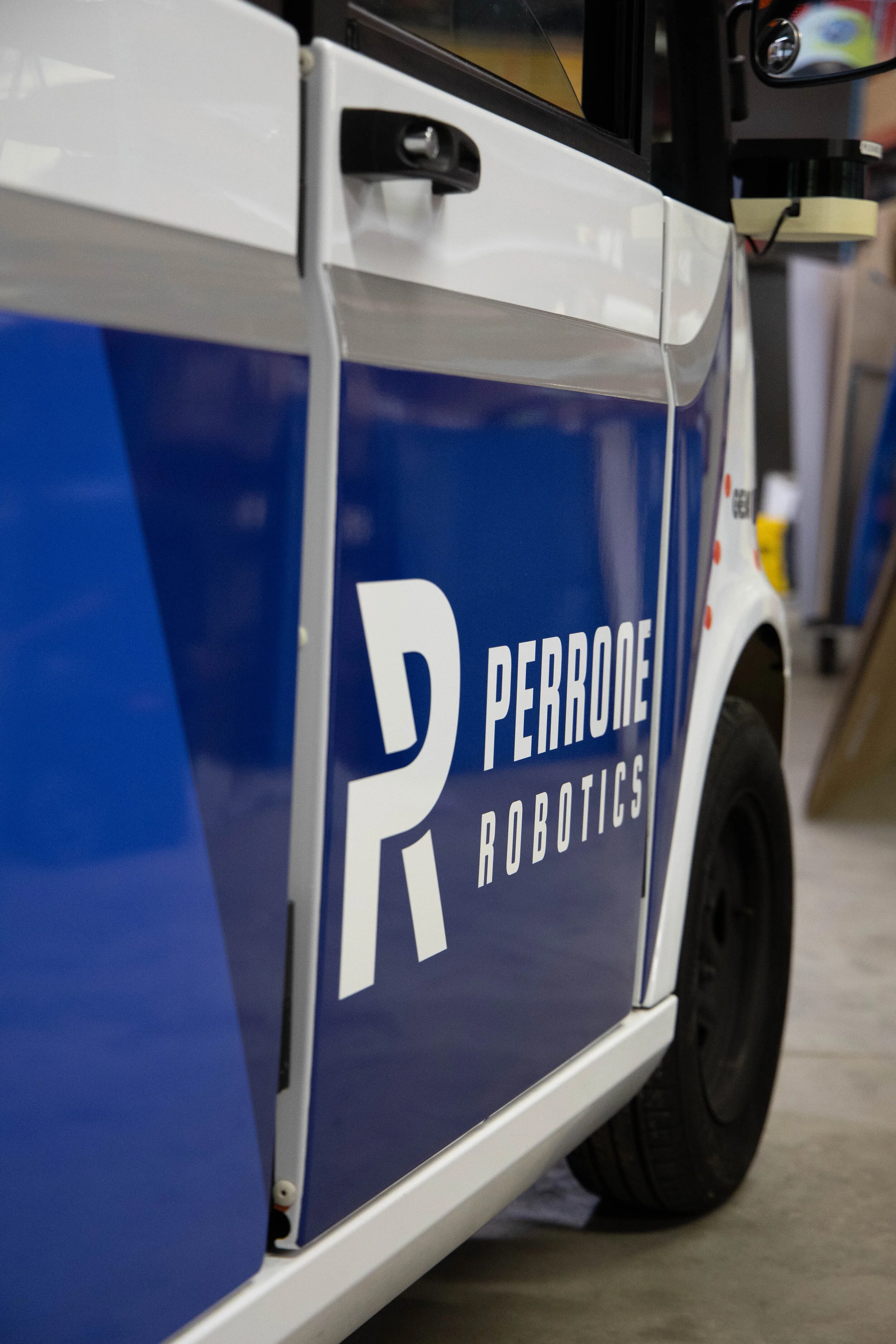 Perrone Robotics Autonomous Shuttle Wrap | MAD Creative Concepts