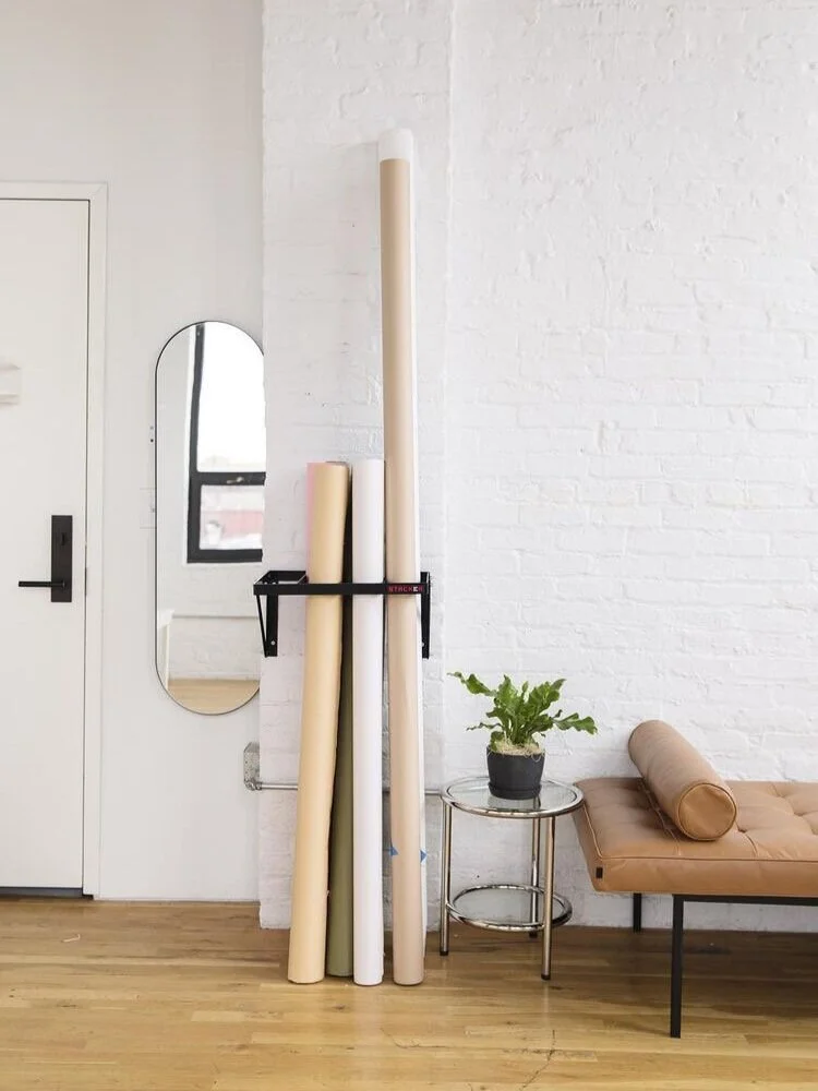 Stacker backdrop storage rack for photo studios