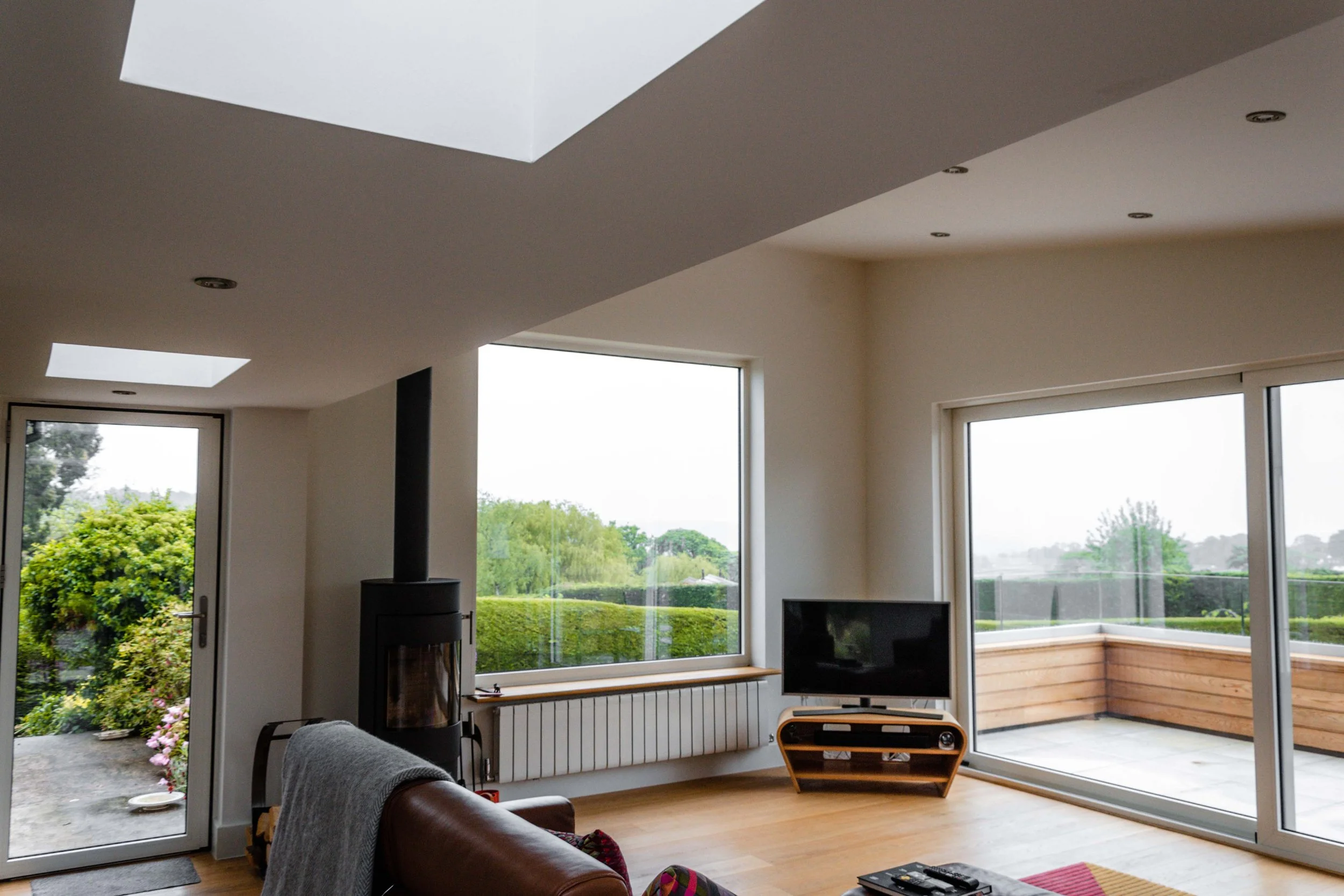 Timber claded monopitch front extension with balcony to Derbyshire ...