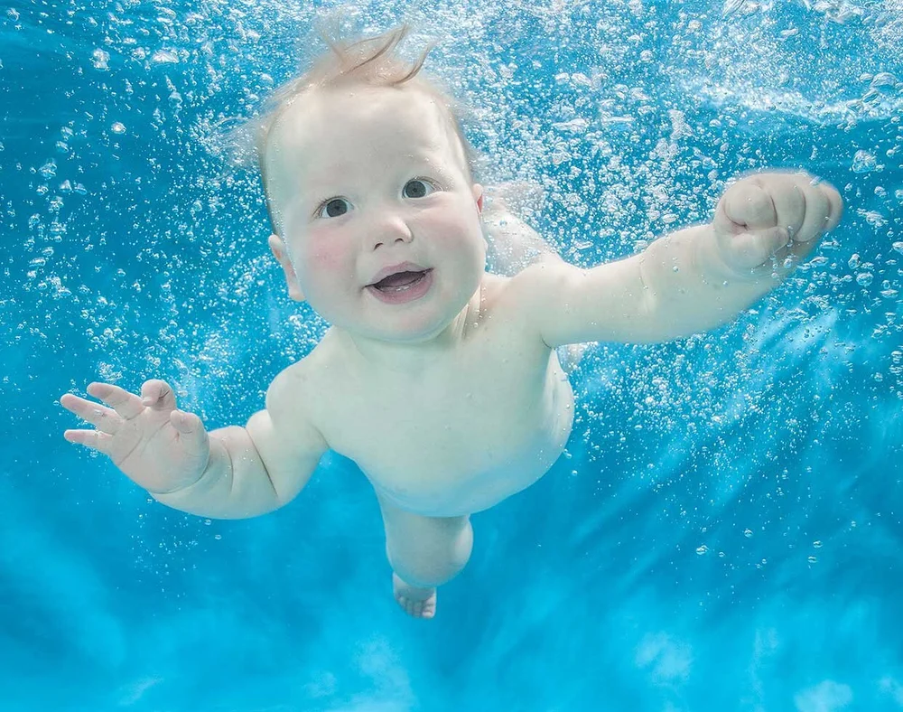 Babies swim underwater in this creative portfolio of water photography ...