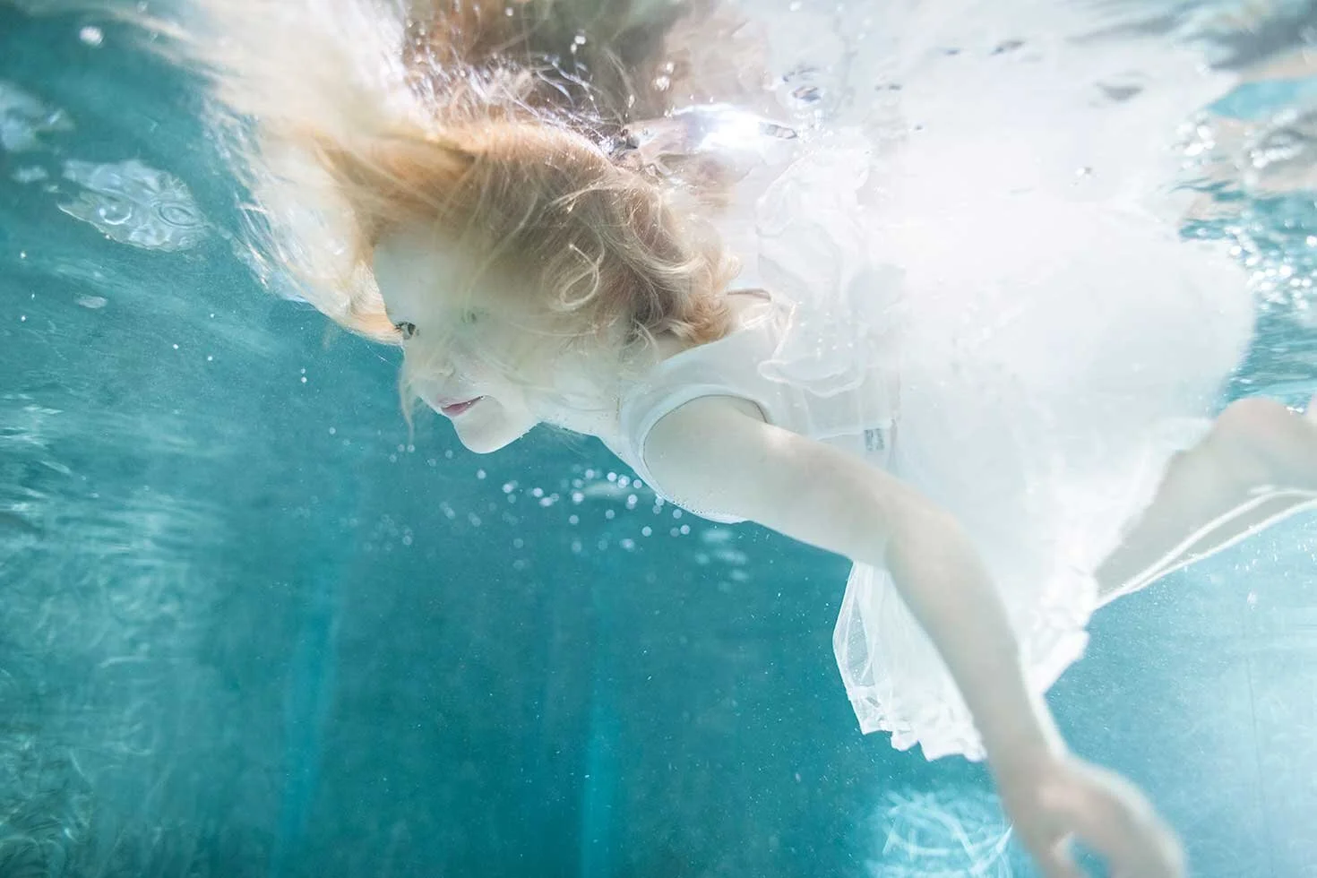 Babies swim underwater in this creative portfolio of water photography ...