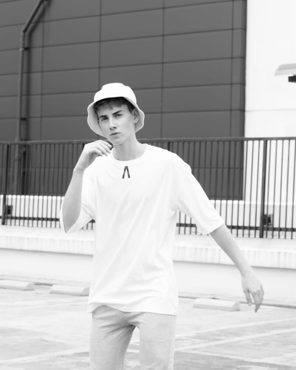 Young model strikes a pose around the globe — GRID NEWS