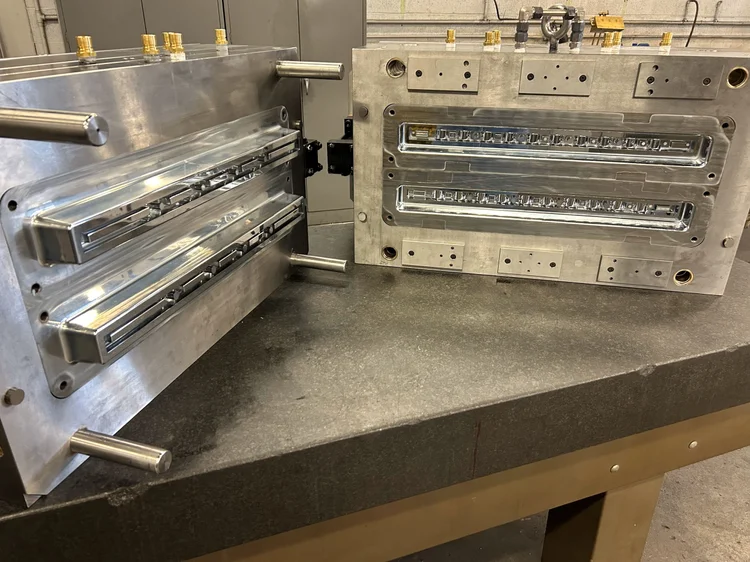 (2) cavity compression mold for power cable bracket - Diemaster