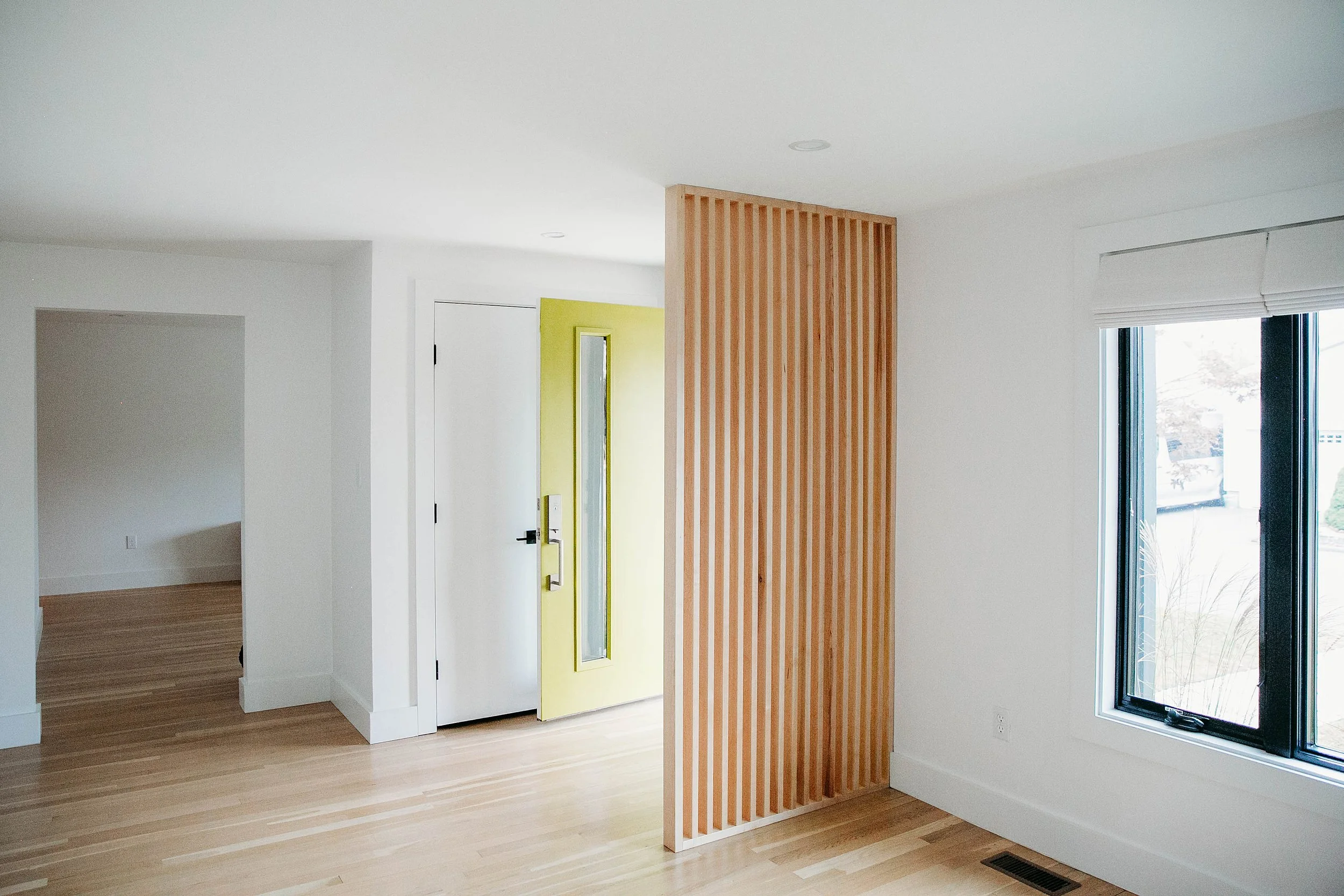 A divided entry at a #dwelloctoberstudio mid-century modern fixer-upper ...