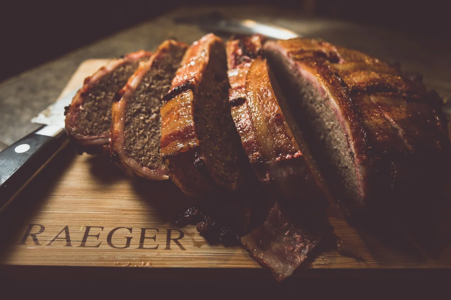 Wild game meat venison or buffalo meatloaf wrapped in bacon and smoked ...
