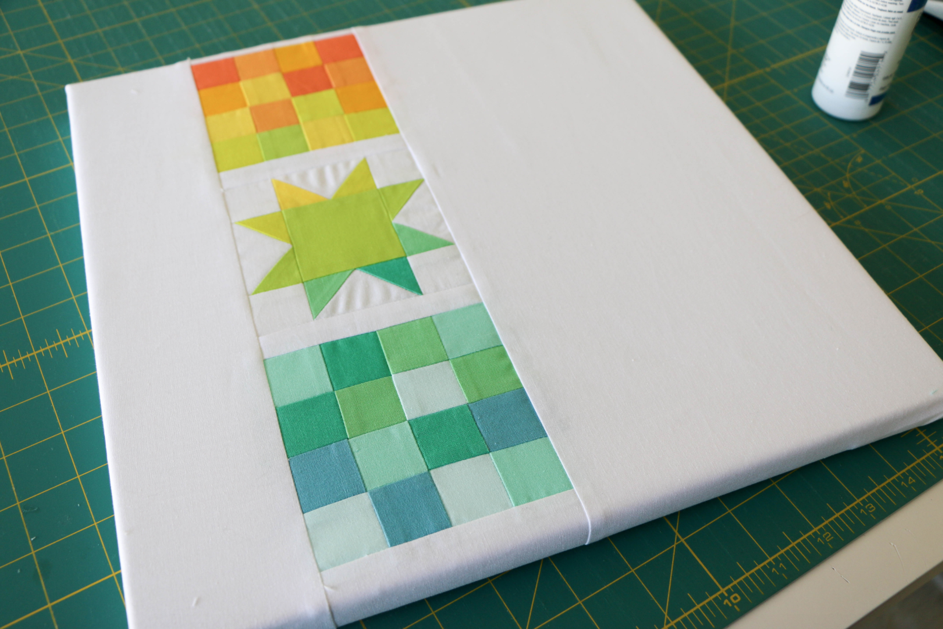 How to wrap fabric on a canvas frame — Lee Heinrich Designs modern ...
