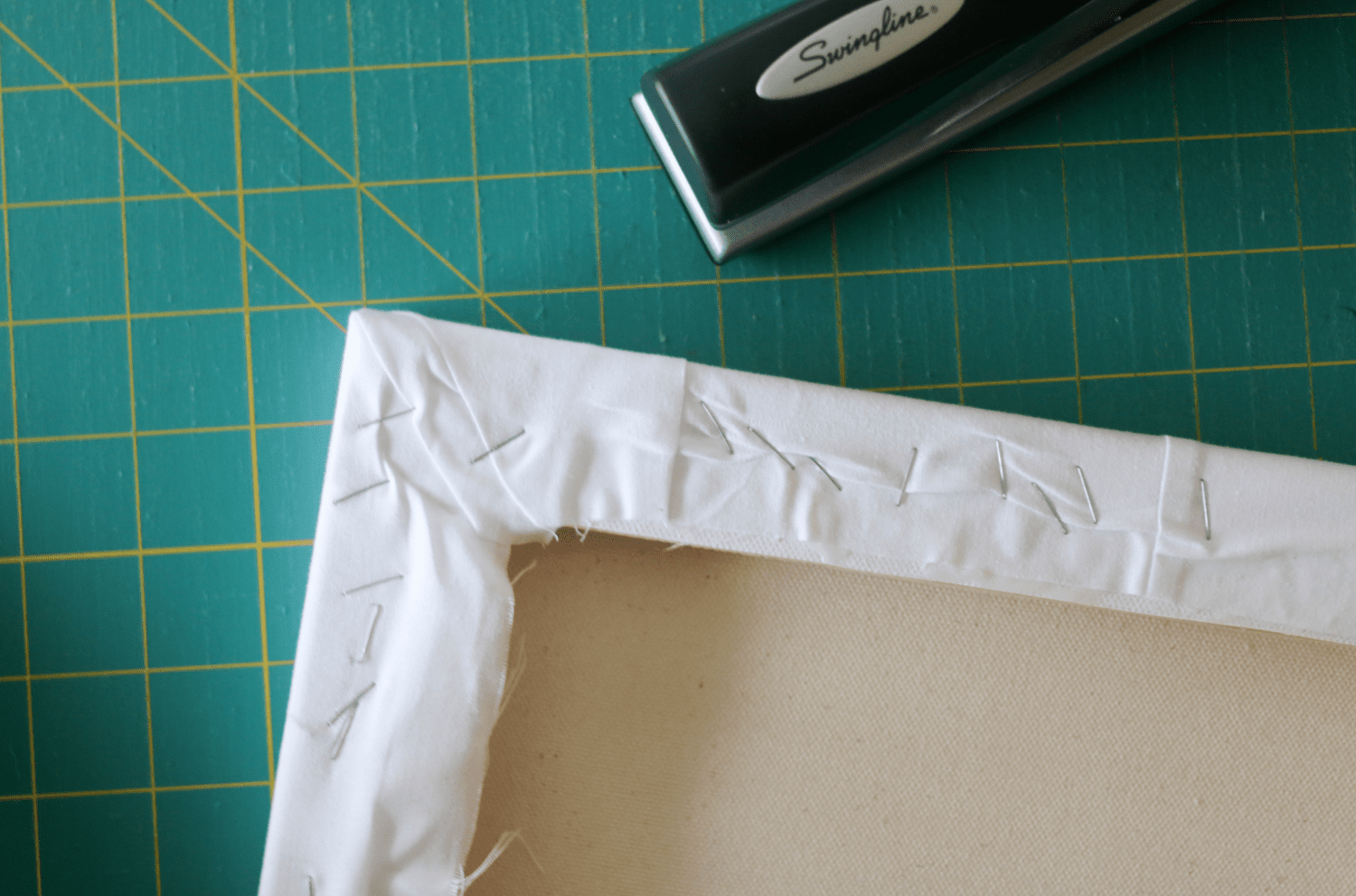 How to wrap fabric on a canvas frame — Lee Heinrich Designs modern ...