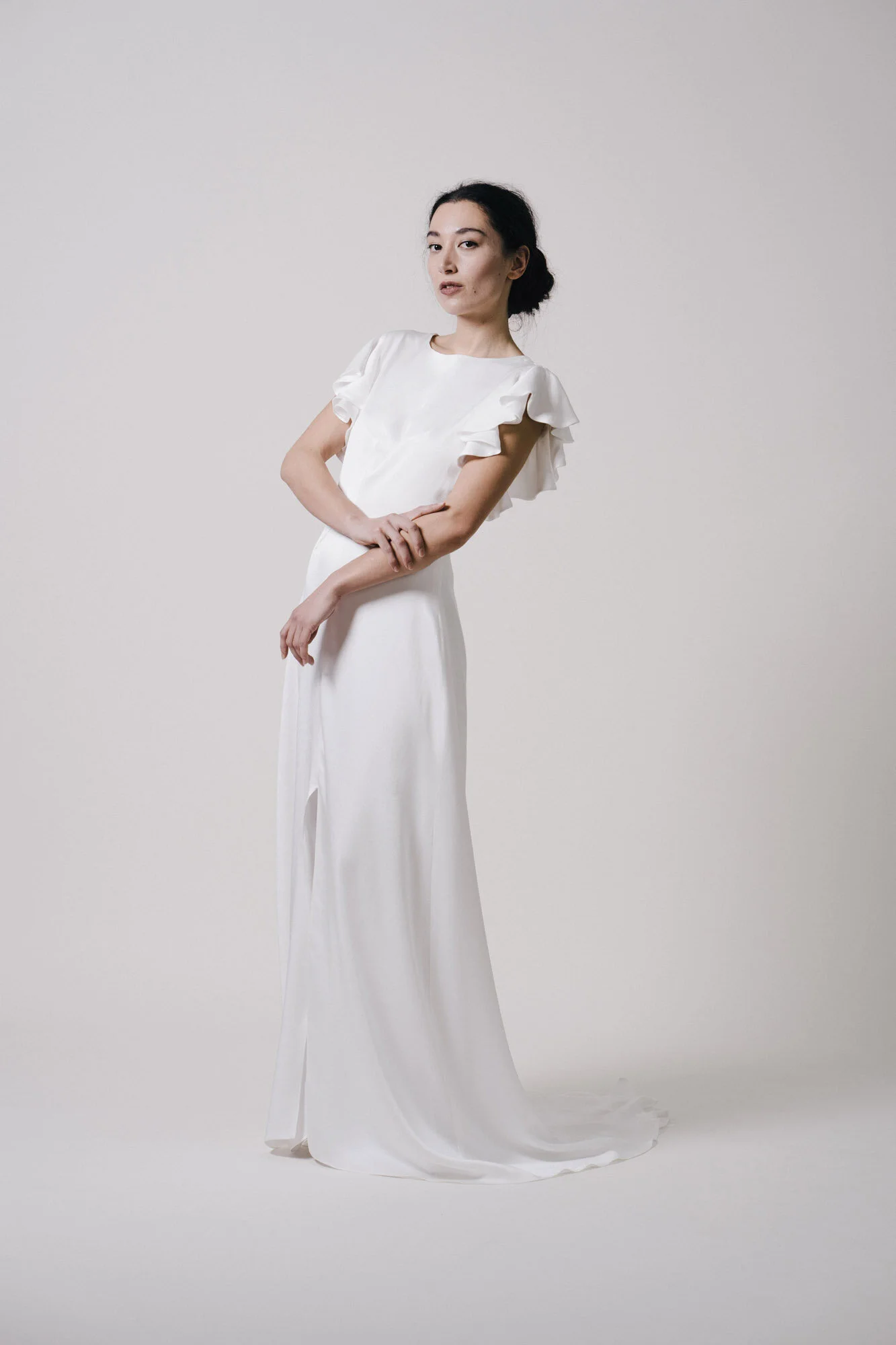 The Dopamine Dress. Cutout low-back wedding dress with flutter sleeves ...