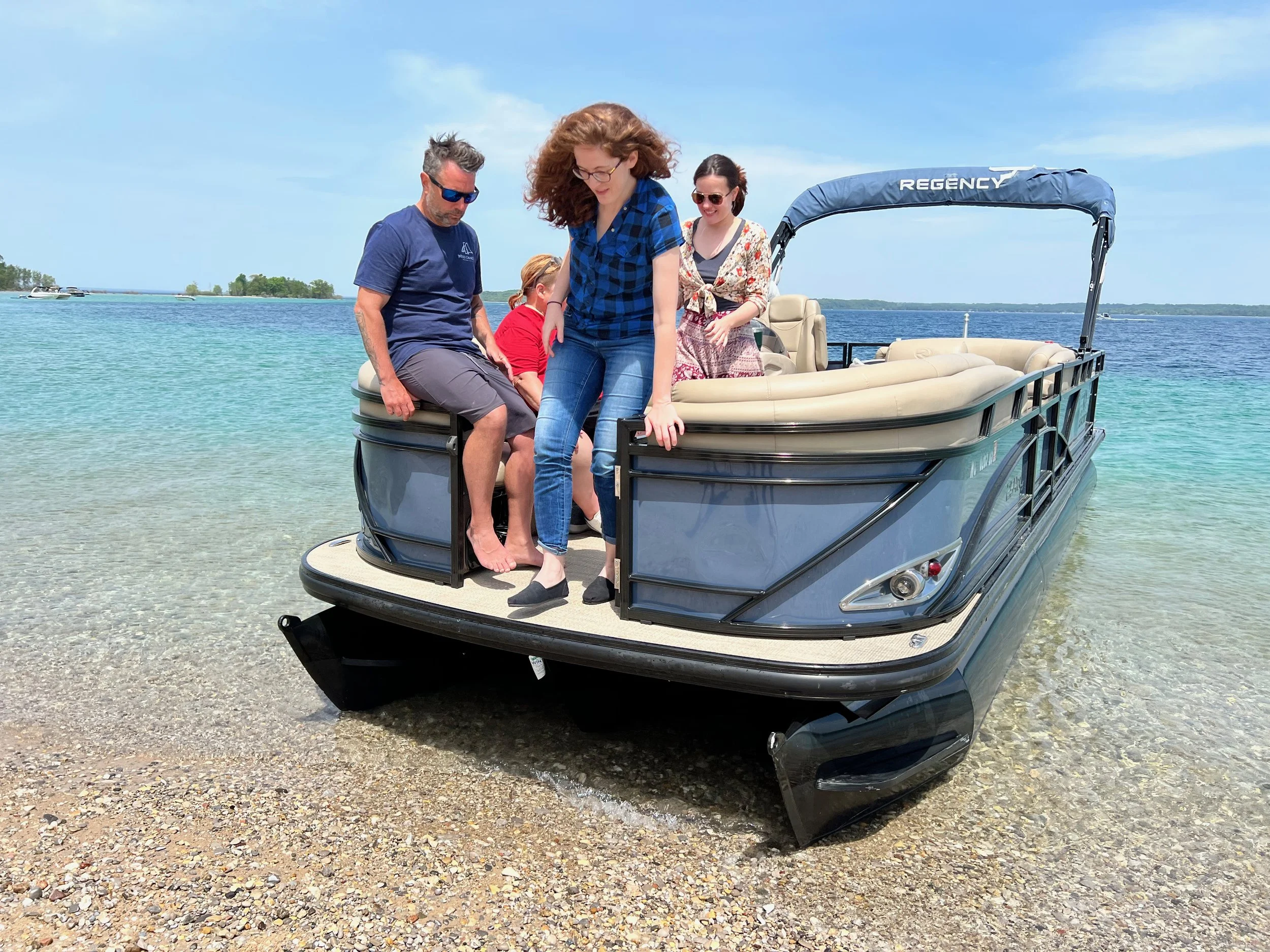 A Luxury Pontoon w/Captain Day Charter — The Wind Dancer Experience