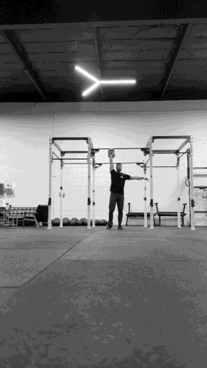 Single-arm Overhead Carry — We Are OLLIN