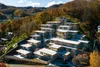 Kengo Kuma nestles staggered housing complex on Japanese hillside ...