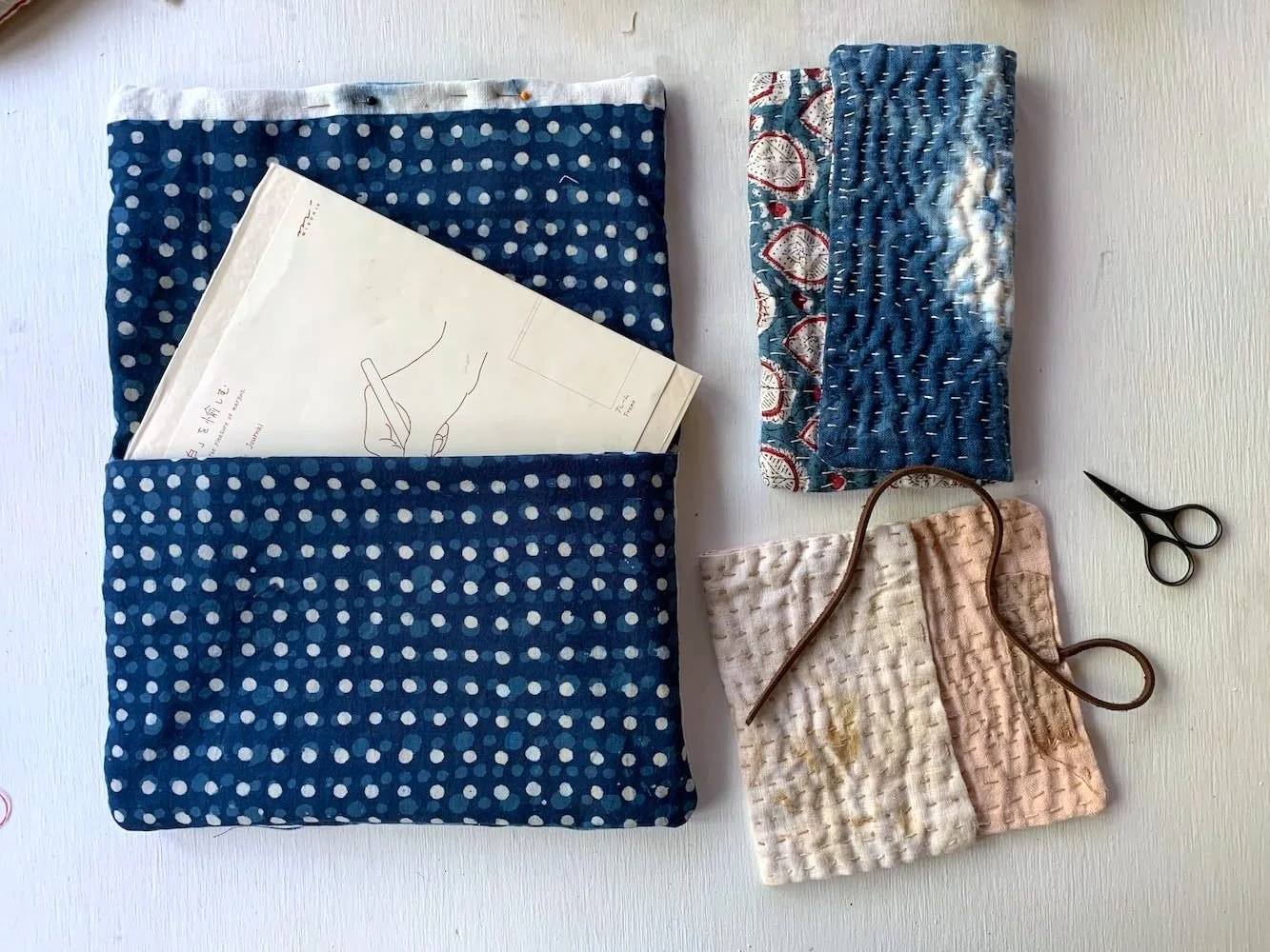 hand stitched circular drawstring pouch — petalplum