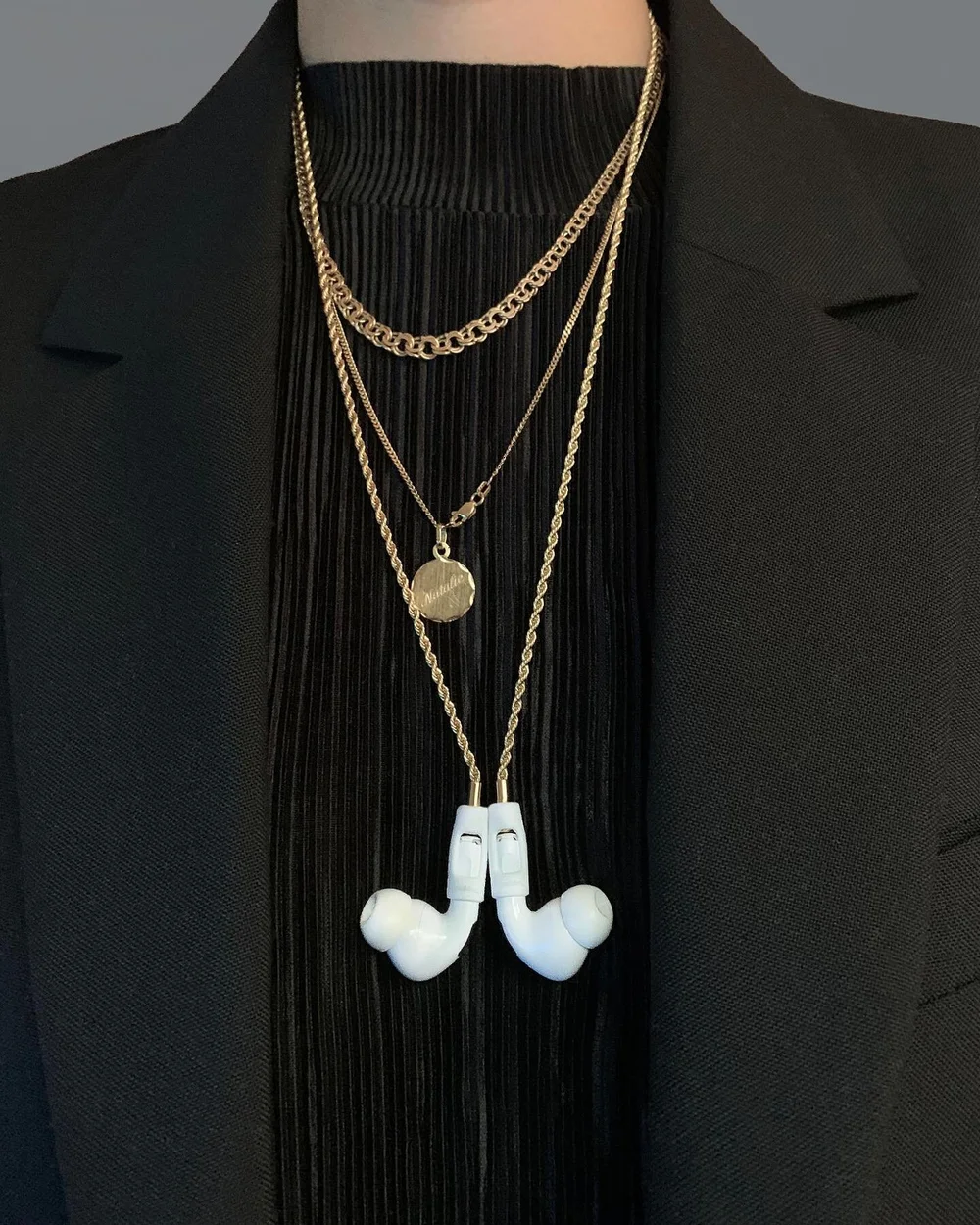 You can now buy a solid gold AirPod chain - And we are here for it ...