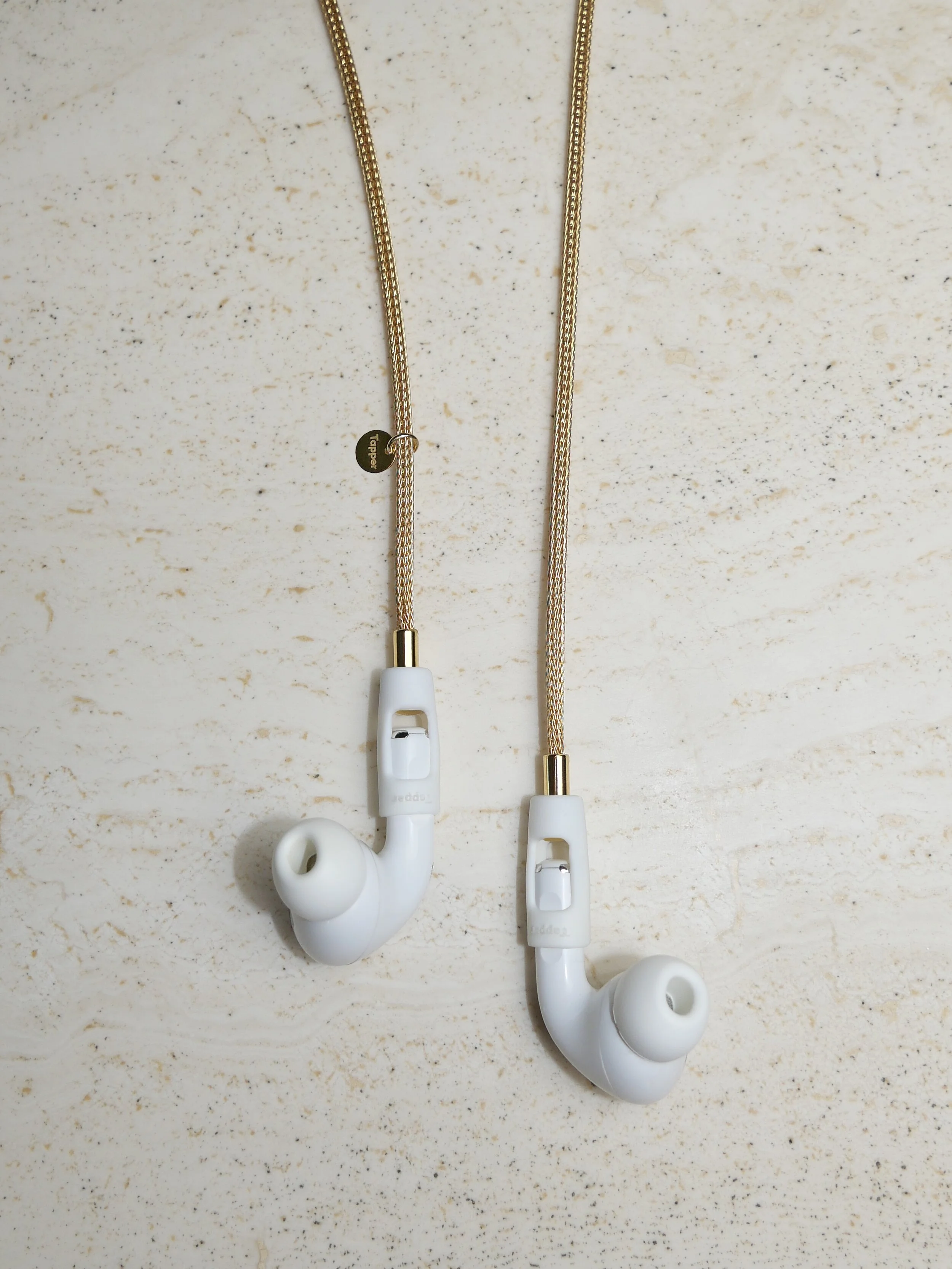 You can now buy a solid gold AirPod chain - And we are here for it ...