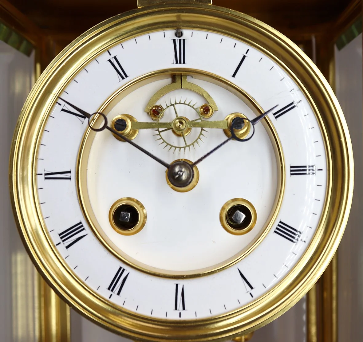 A Gilded French Four Glass Clock with Visible Escapement and Ellicott ...
