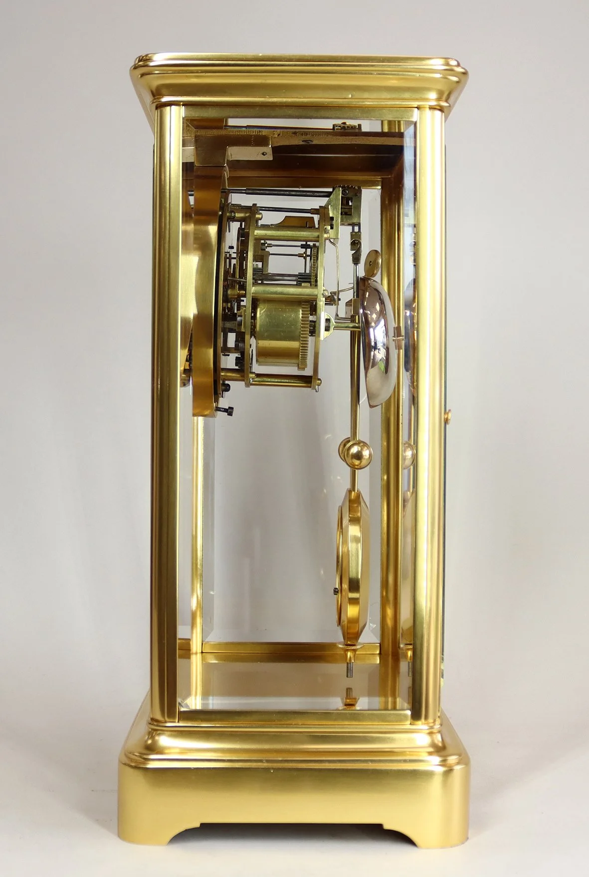 A Gilded French Four Glass Clock with Visible Escapement and Ellicott ...