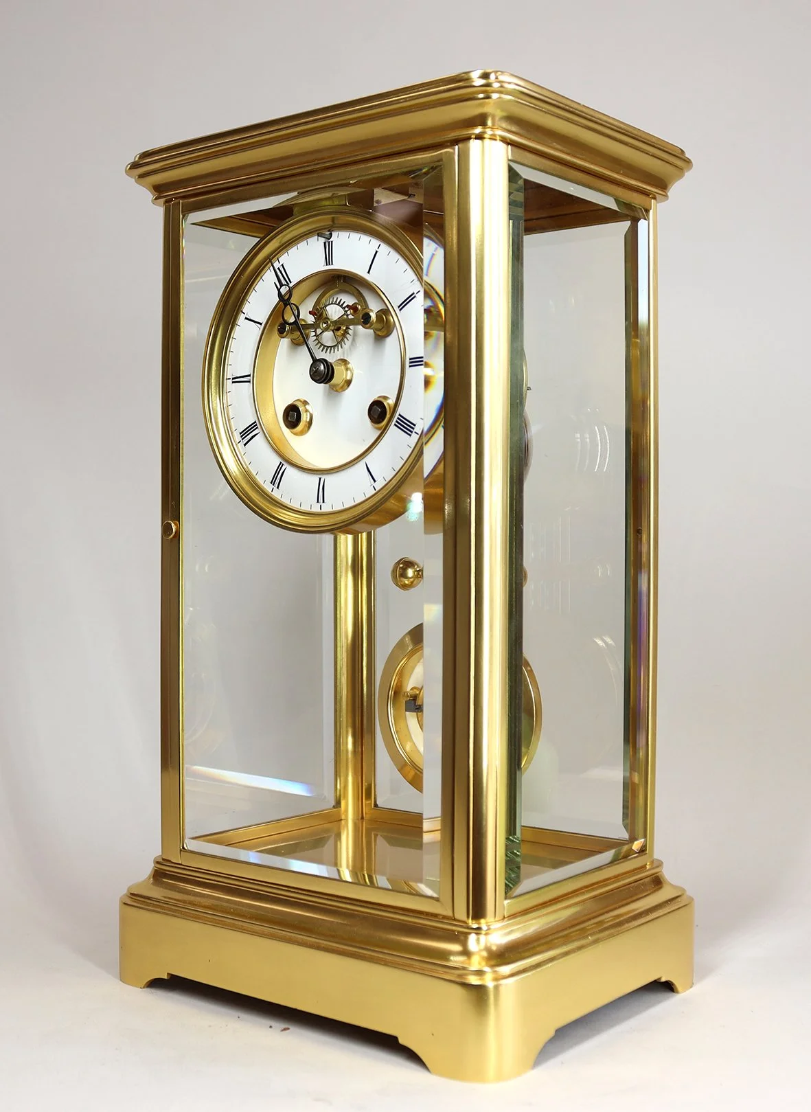 A Gilded French Four Glass Clock with Visible Escapement and Ellicott ...