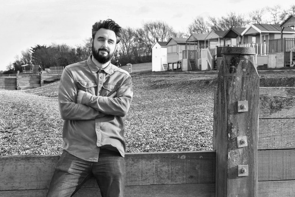 About 1 — GEORGE PERRIN