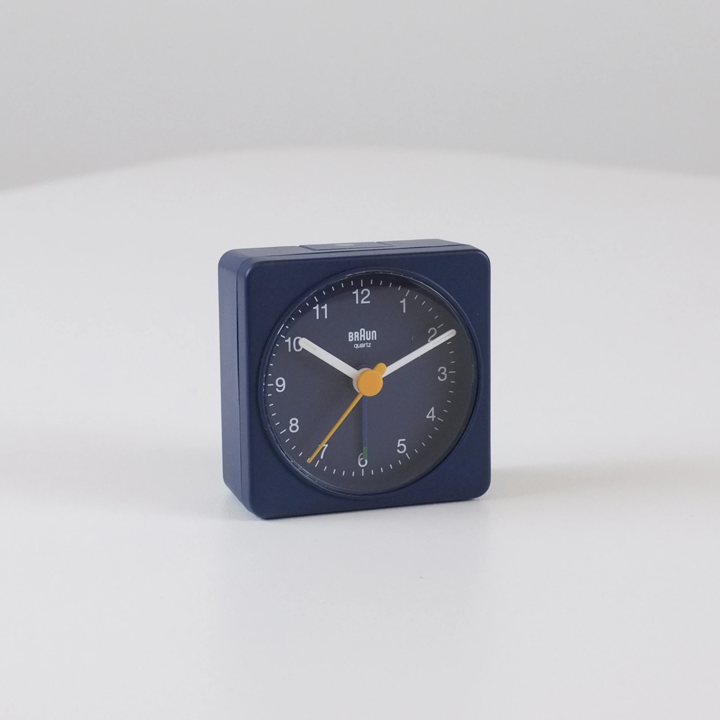 Small Black BC06 Wall Clock by Braun — KIOSK