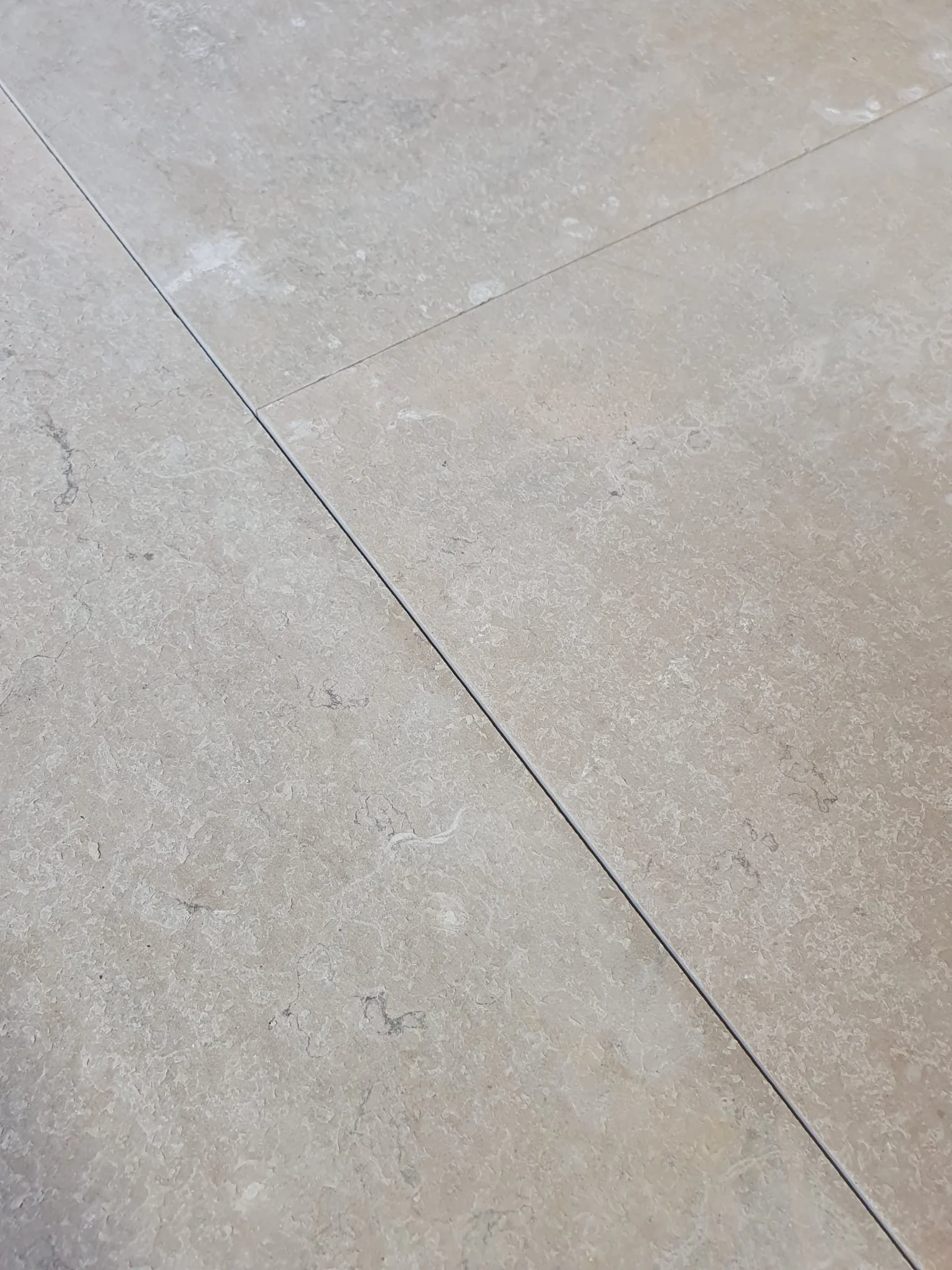 Bianca Flamed Portuguese Limestone Paving — Allgreen