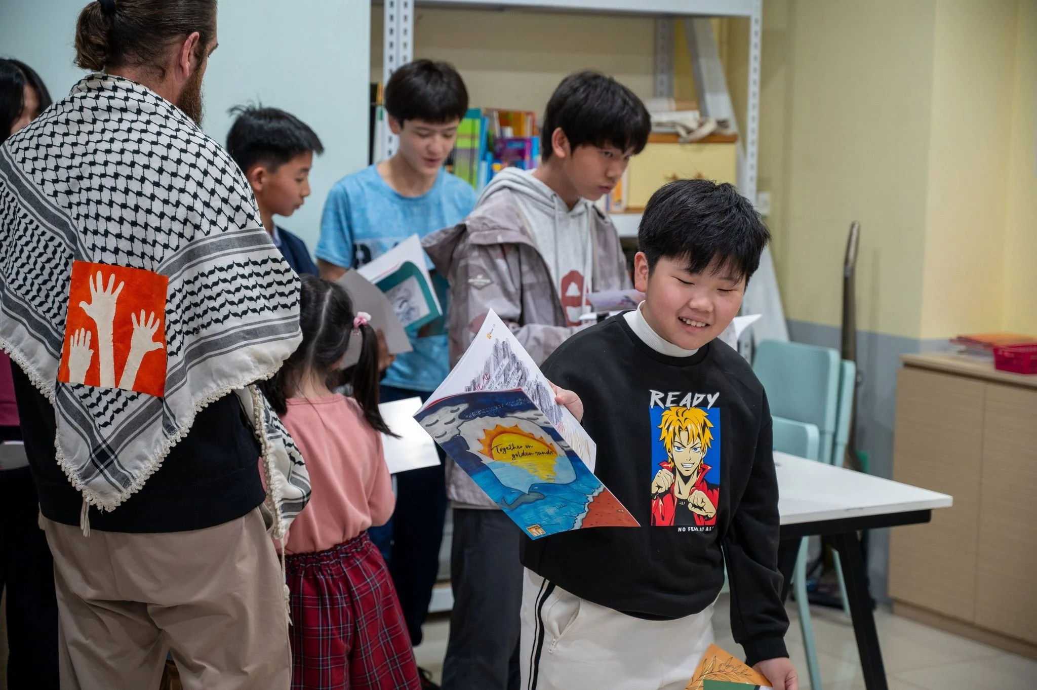 Building Bridges with Words — The Hands Up Project