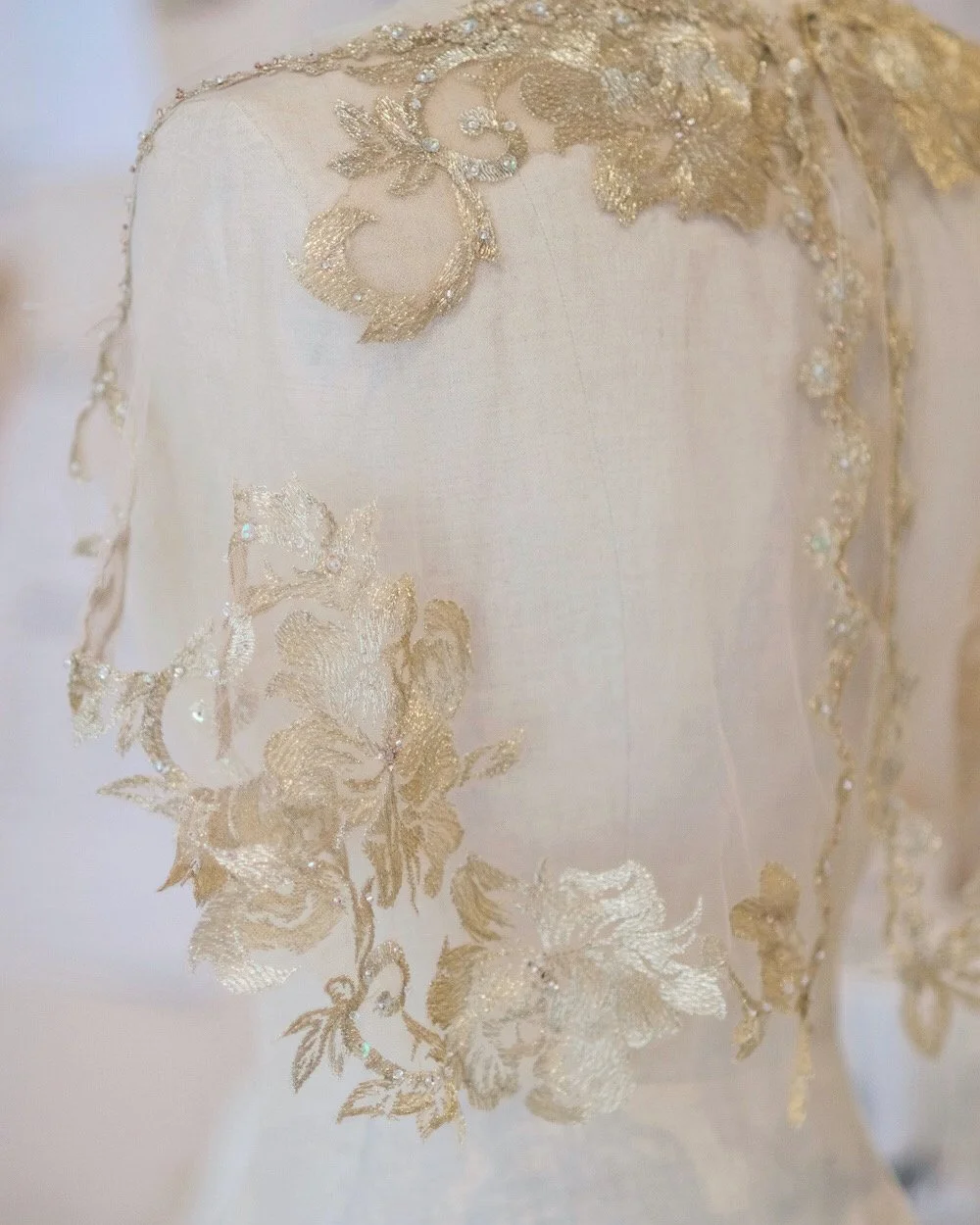 A couture dress and hand-beaded cape in gold lace — To Gather And Stitch