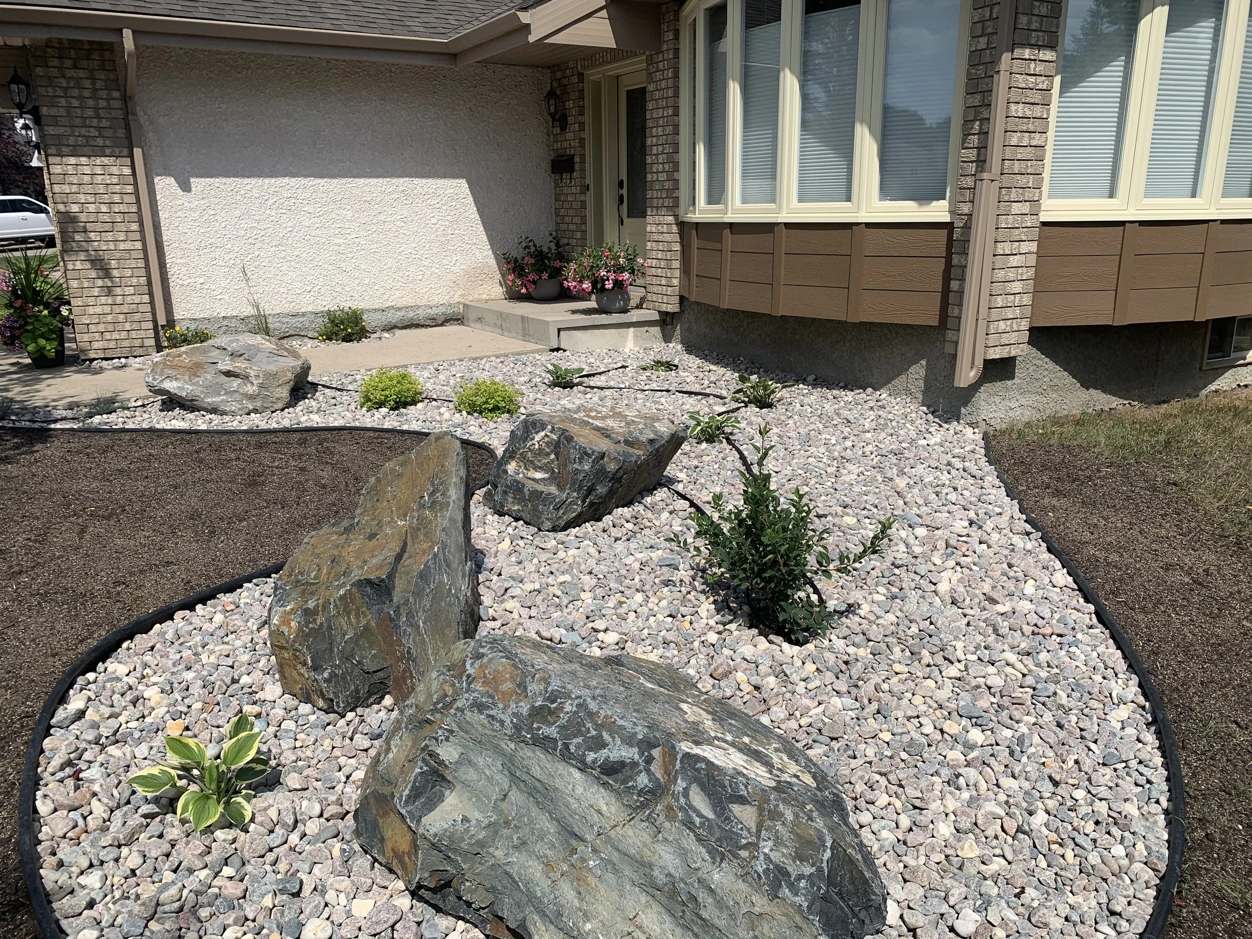 Rock Bed Installation in Winnipeg | Bulger Brothers Landscape