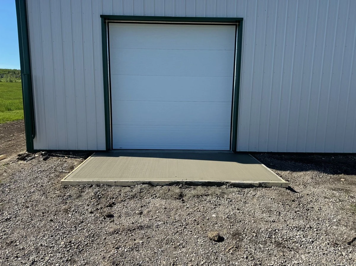 Post Frame Concrete Floors Near Okotoks — RockyView Concrete Services