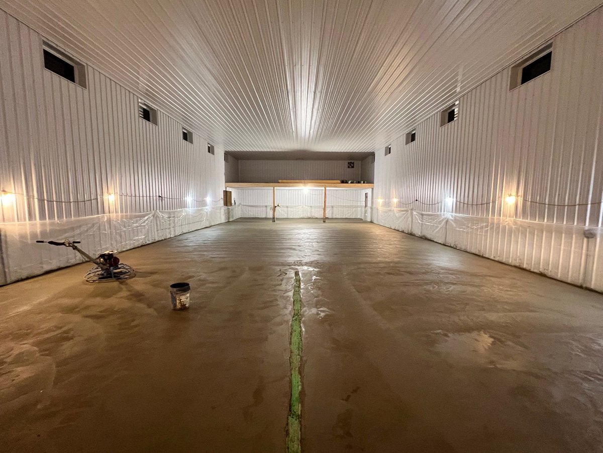 Impressive 40x100 post frame shop floor — RockyView Concrete Services